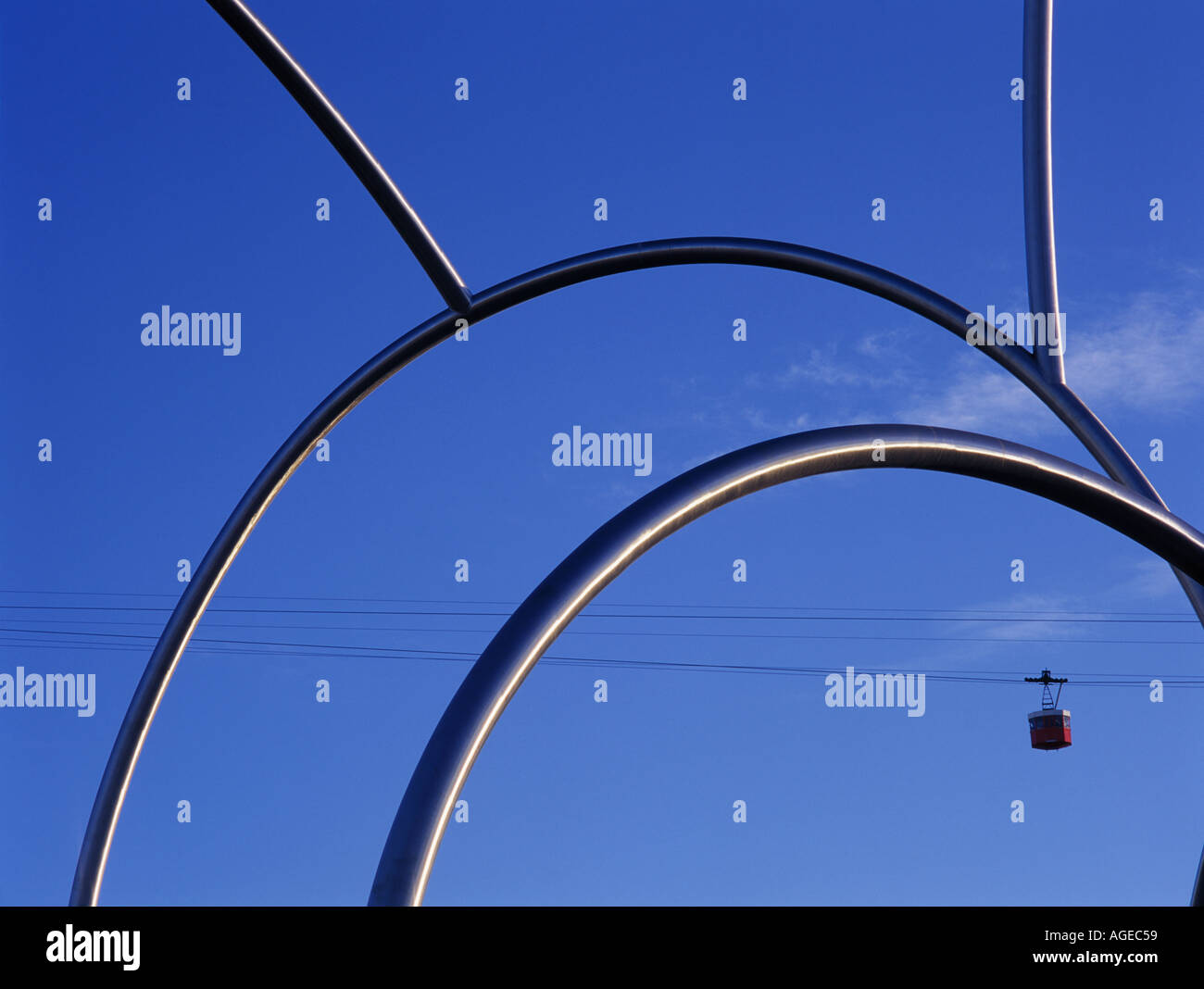 Cable car over Barcelona harbour Spain viewed through stainless steel ...
