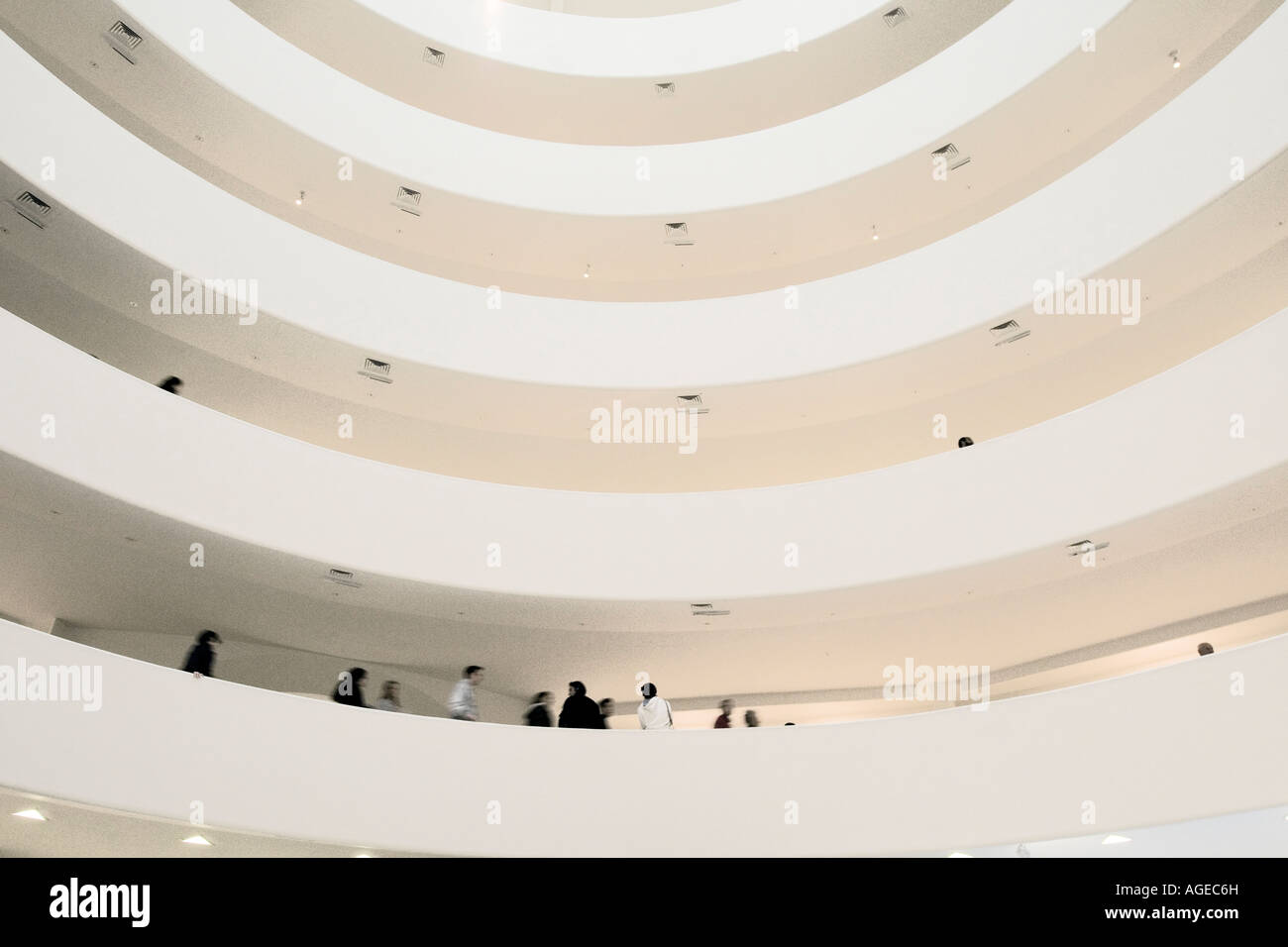 Museum goers walking up the spiral walkway at the Guggenheim museum in ...