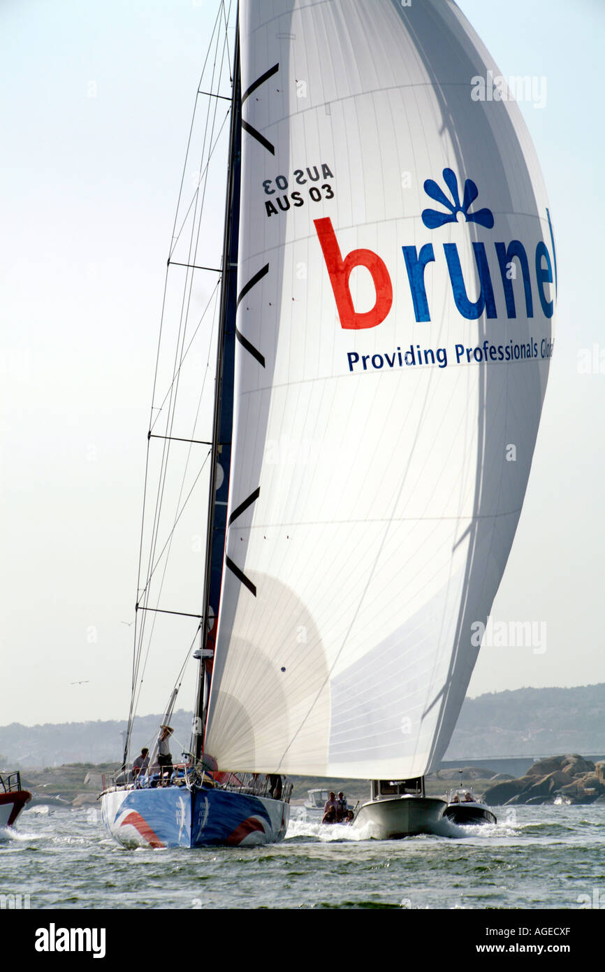 Racing yacht with full gennaker or asymmetric spinnaker sail Stock ...