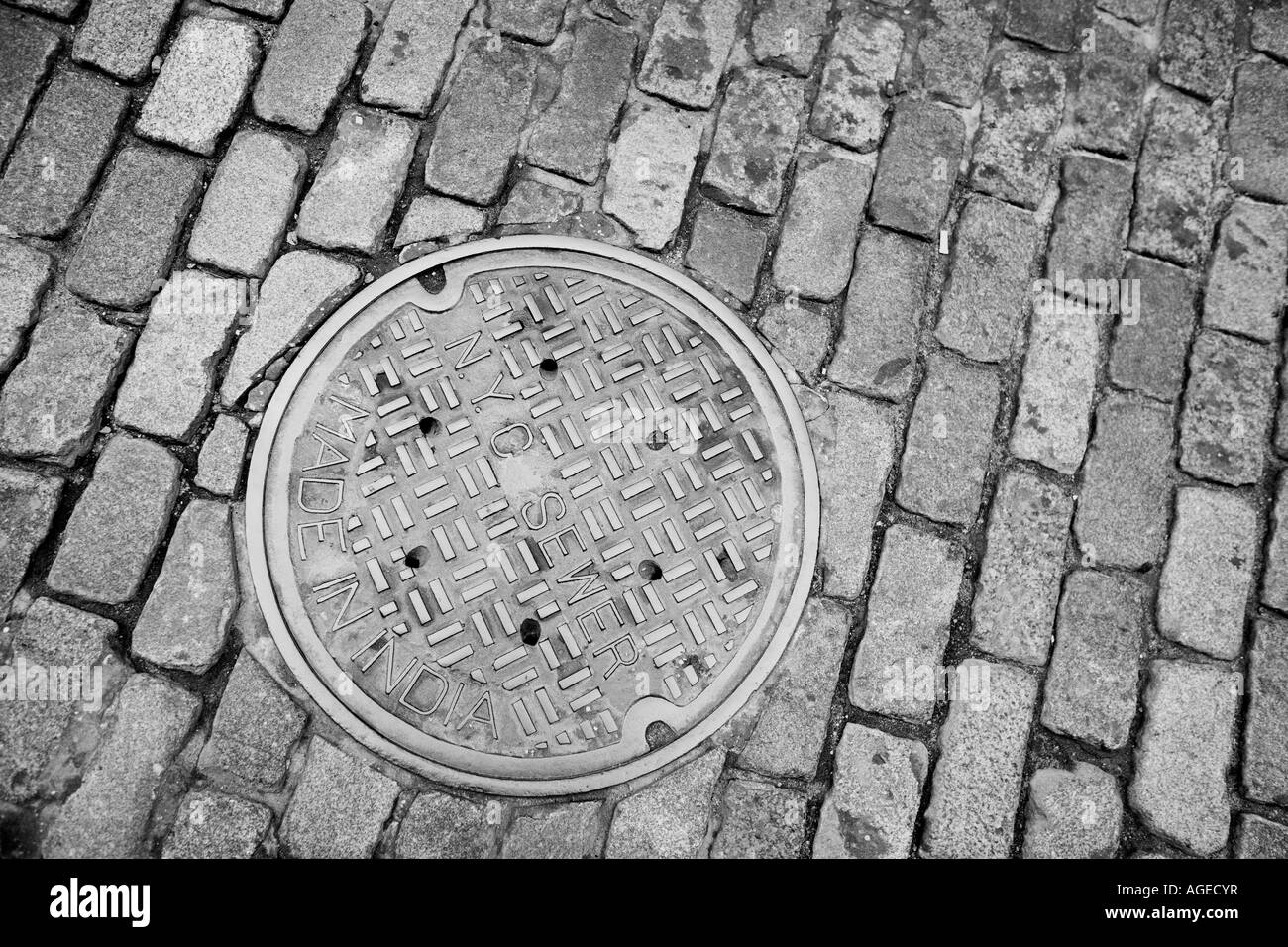 New York city manhole cover Stock Photo - Alamy