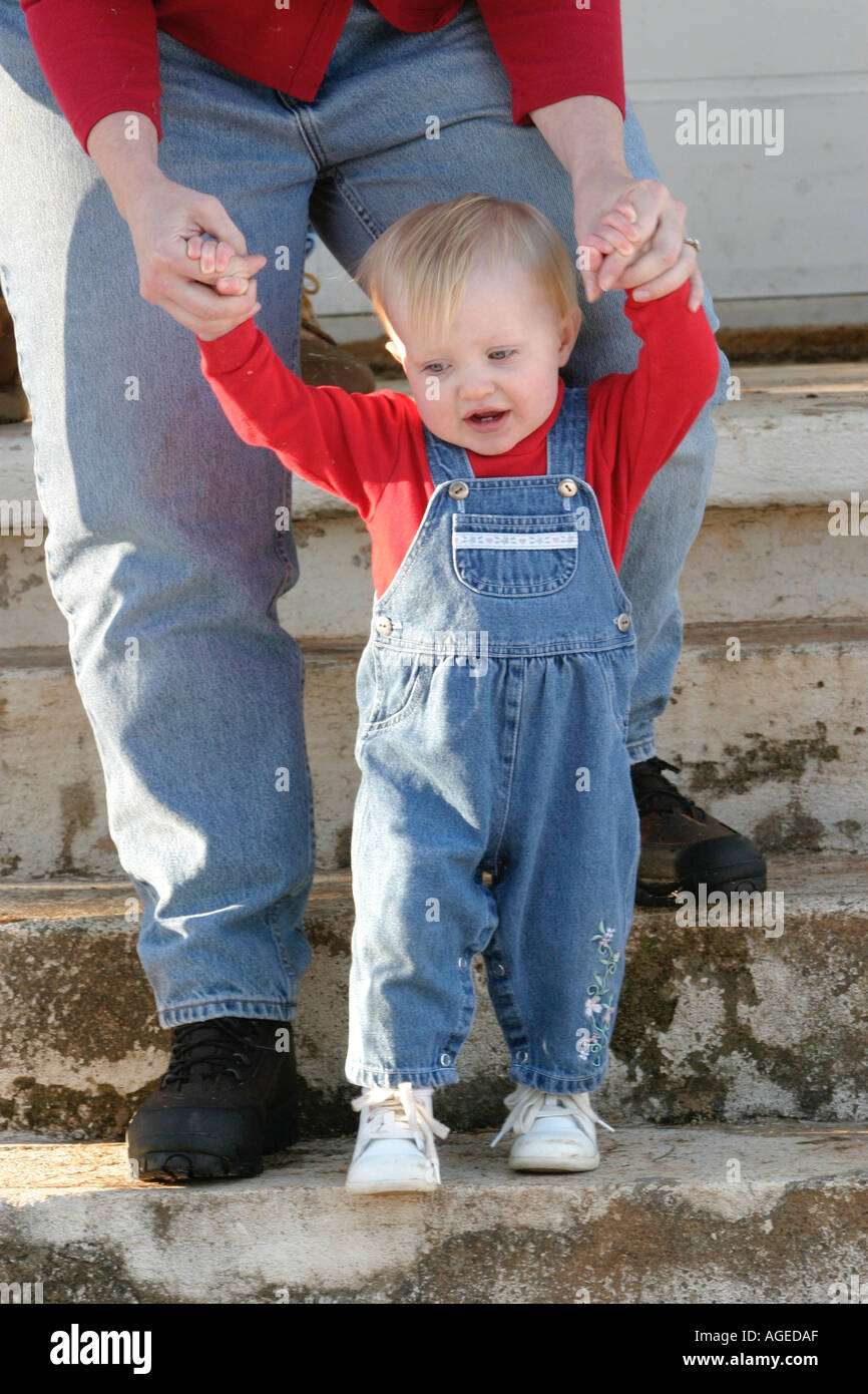 little girl learning to walk Stock Photo - Alamy