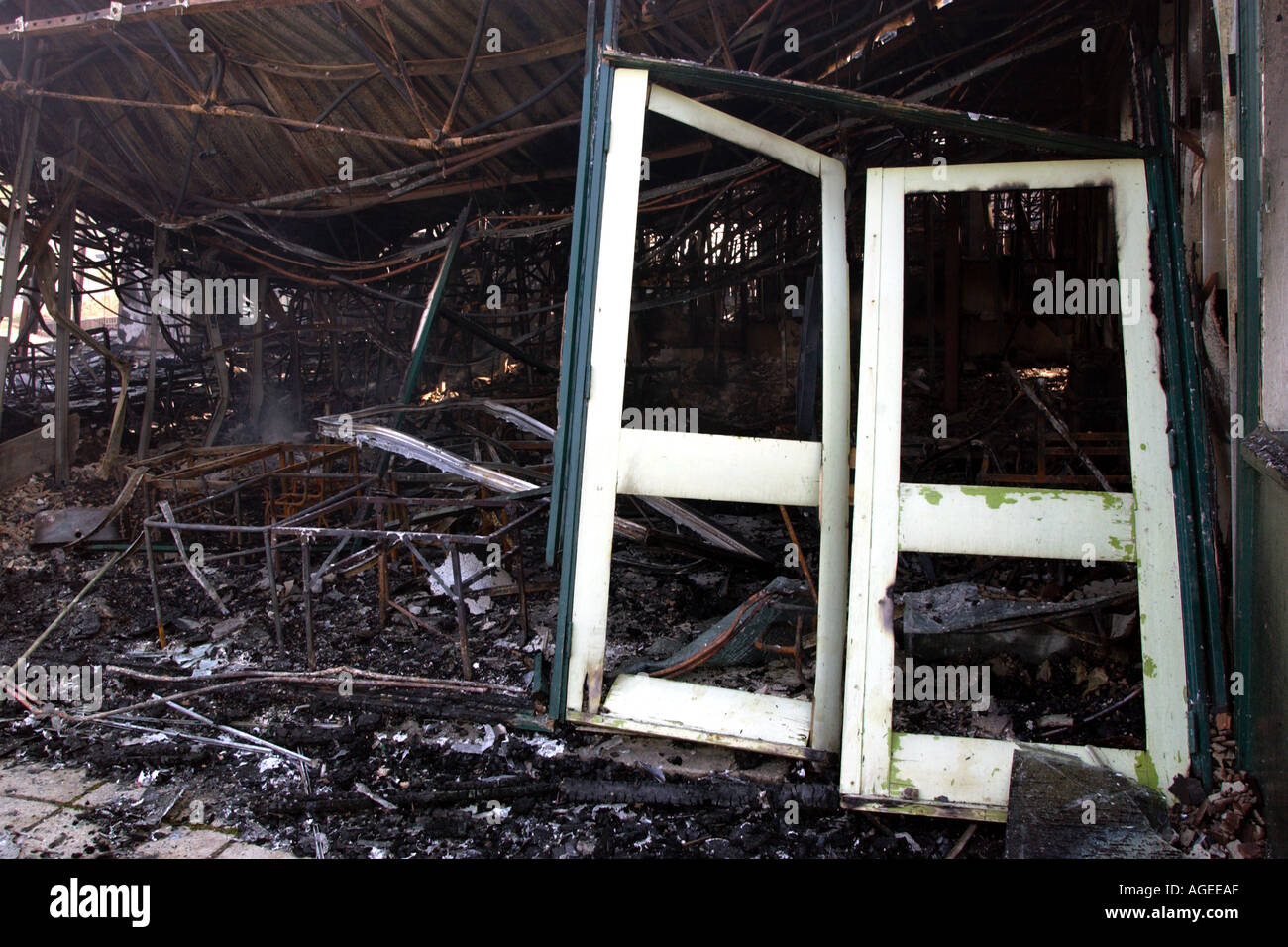 Tangled remains of a classroom after a fire destroyed Rogerstone ...