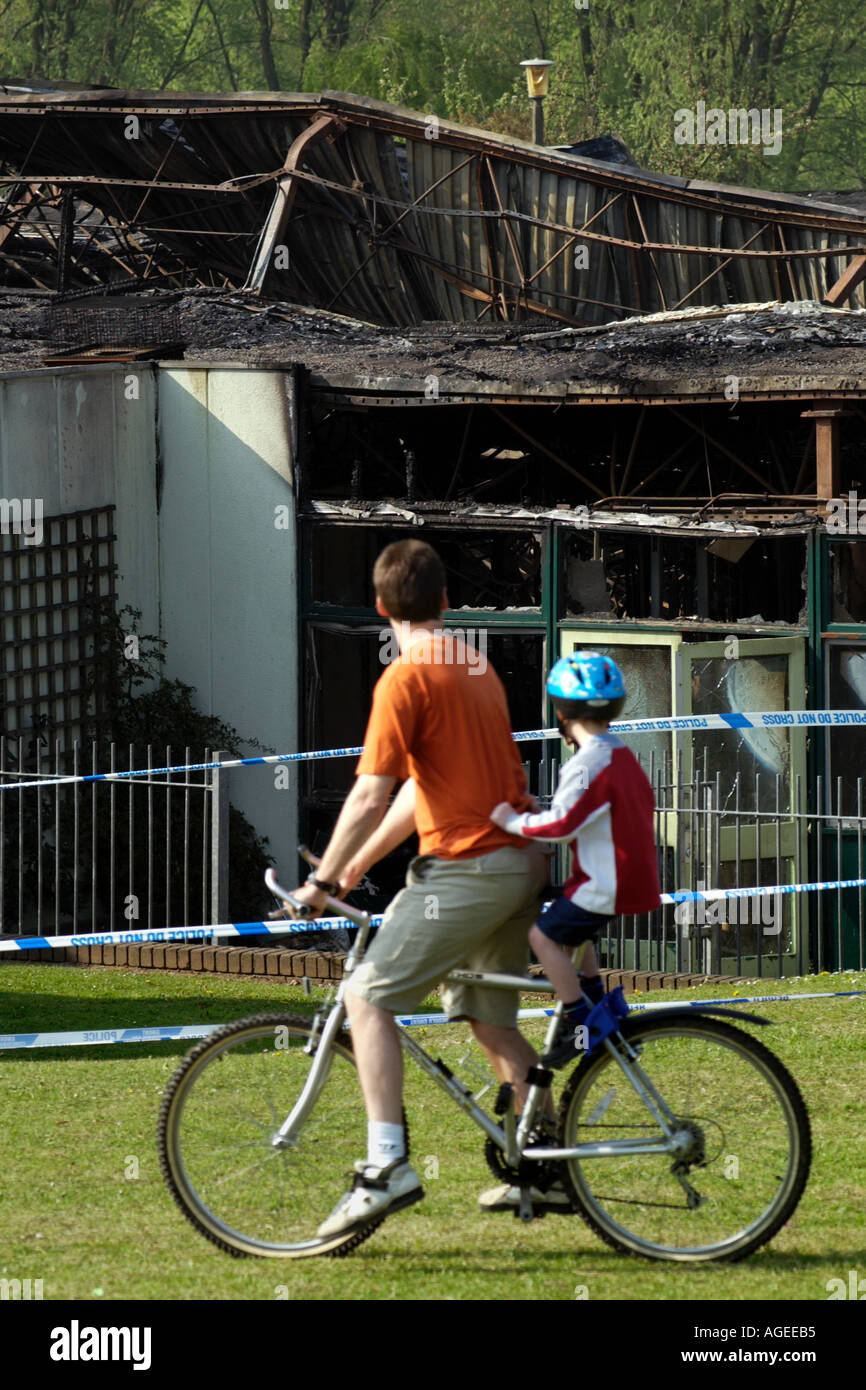 Locals look at the tangled remains of Rogerstone Primary School Newport ...