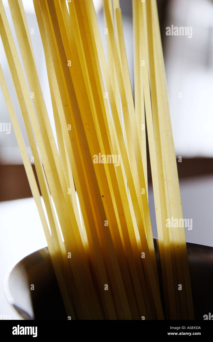 spaghetti close up food italian eat raw yellow pasta Stock Photo - Alamy