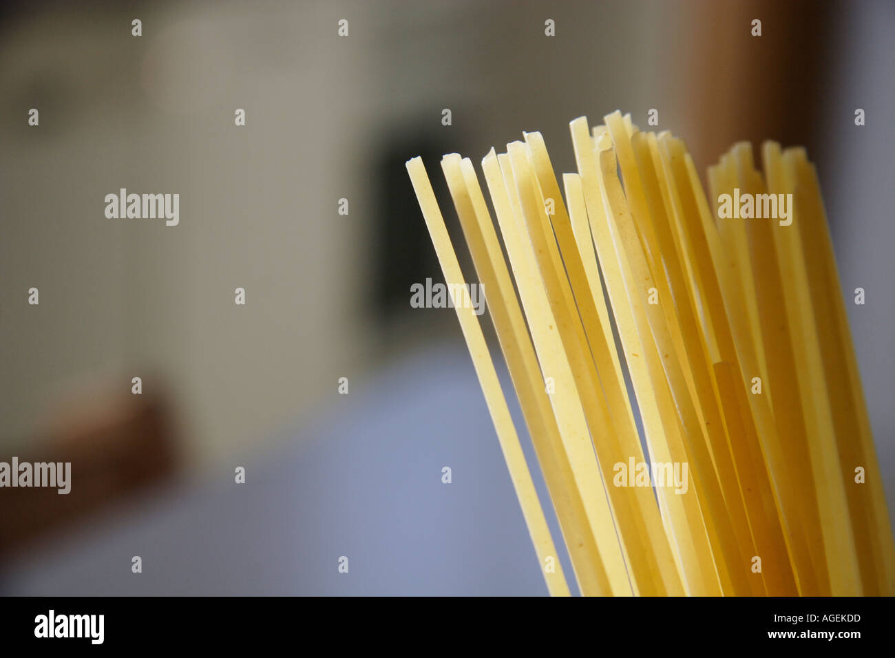 spaghetti close up food italian eat raw yellow pasta Stock Photo - Alamy