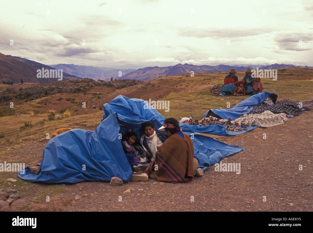 Peruvians Peruvian ethnic Quechua Indians vendors keeping warm seeking ...