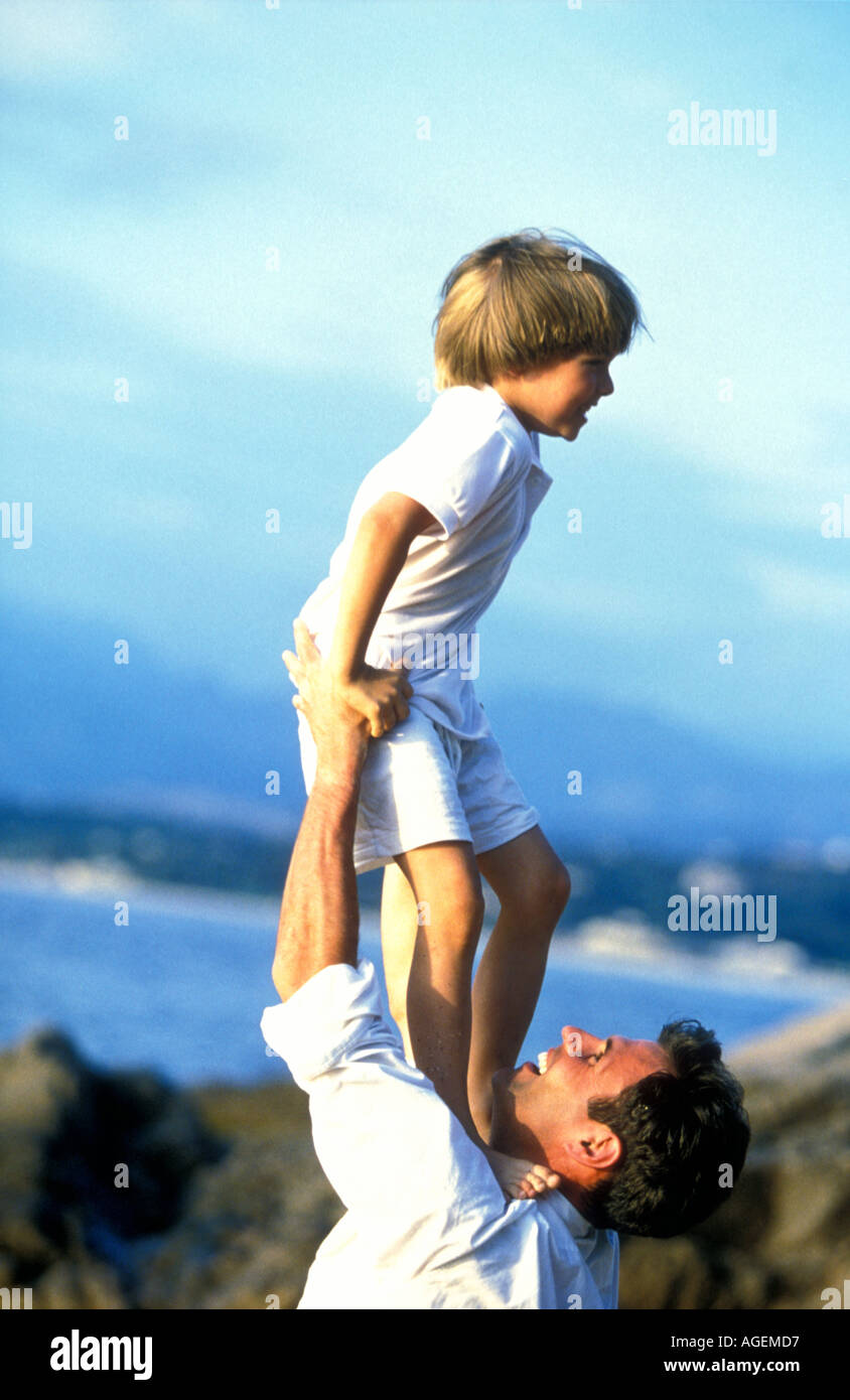 father carrying son Stock Photo - Alamy