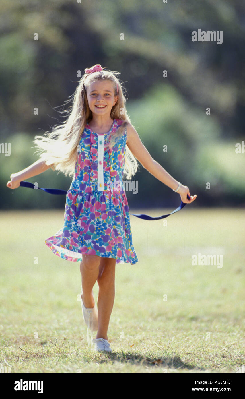 girl skipping outdoors Stock Photo - Alamy