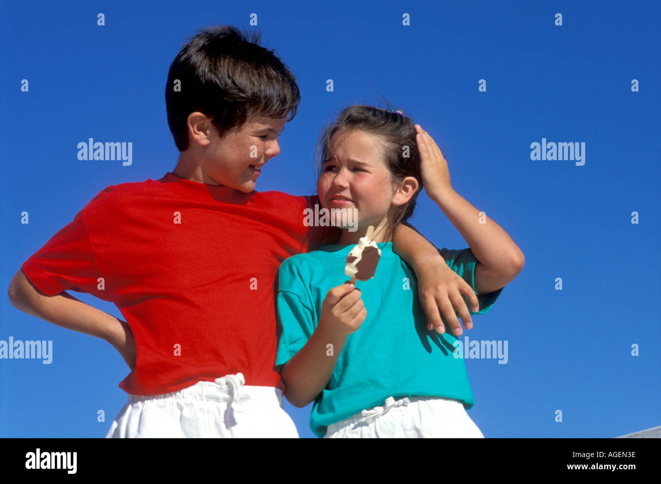 two children embracing Stock Photo - Alamy