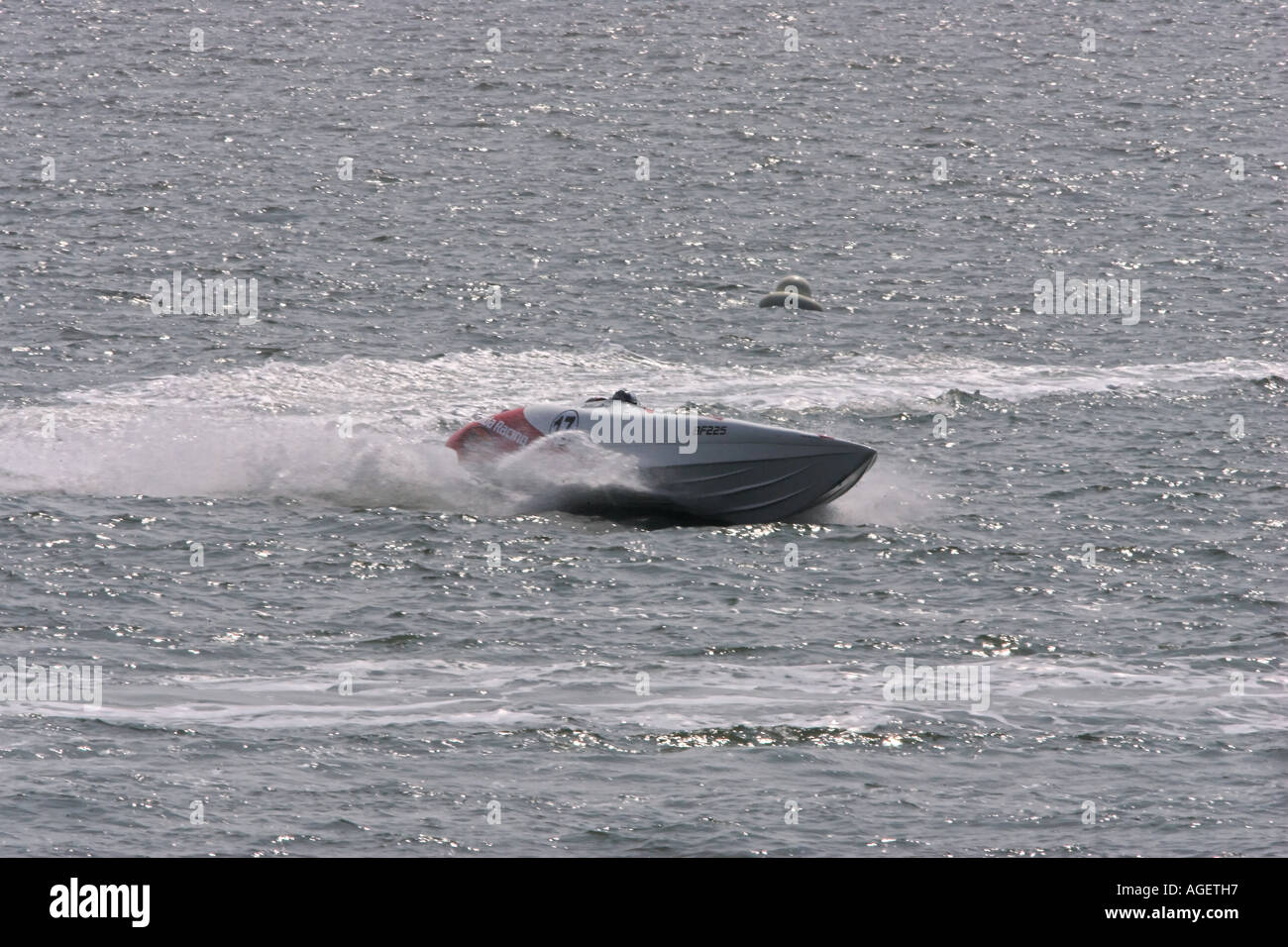 team honda offshore powerboat doing a fast turn Stock Photo - Alamy
