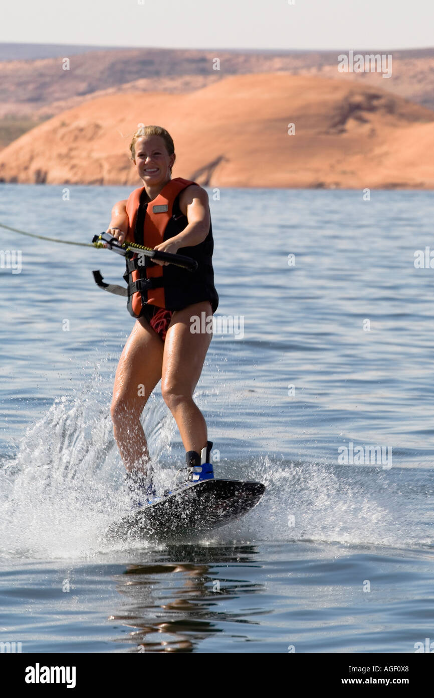 Girl wakeboarding at Lake Powell in Glen Canyon National Recreation ...