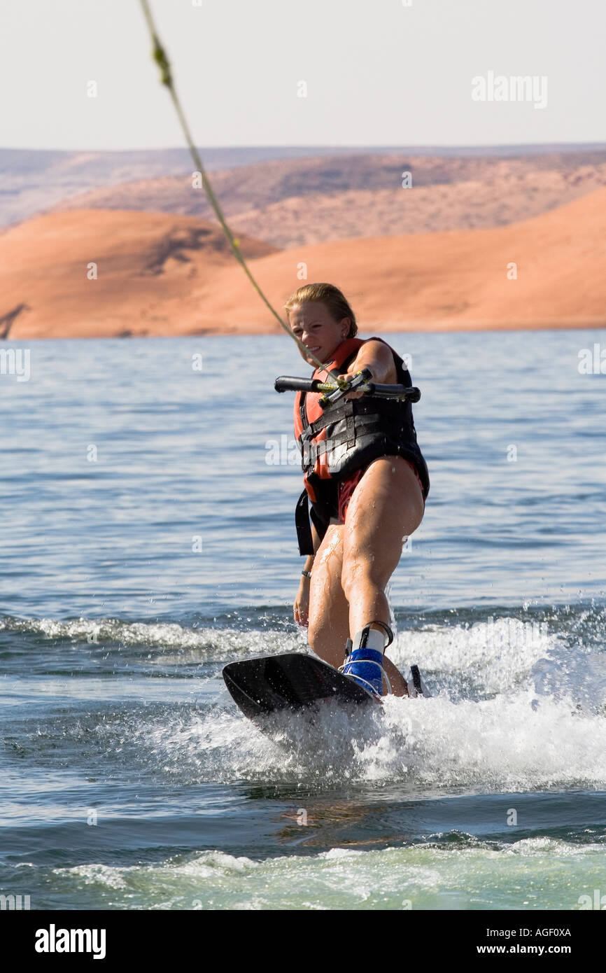 Girl wakeboarding at Lake Powell in Glen Canyon National Recreation ...