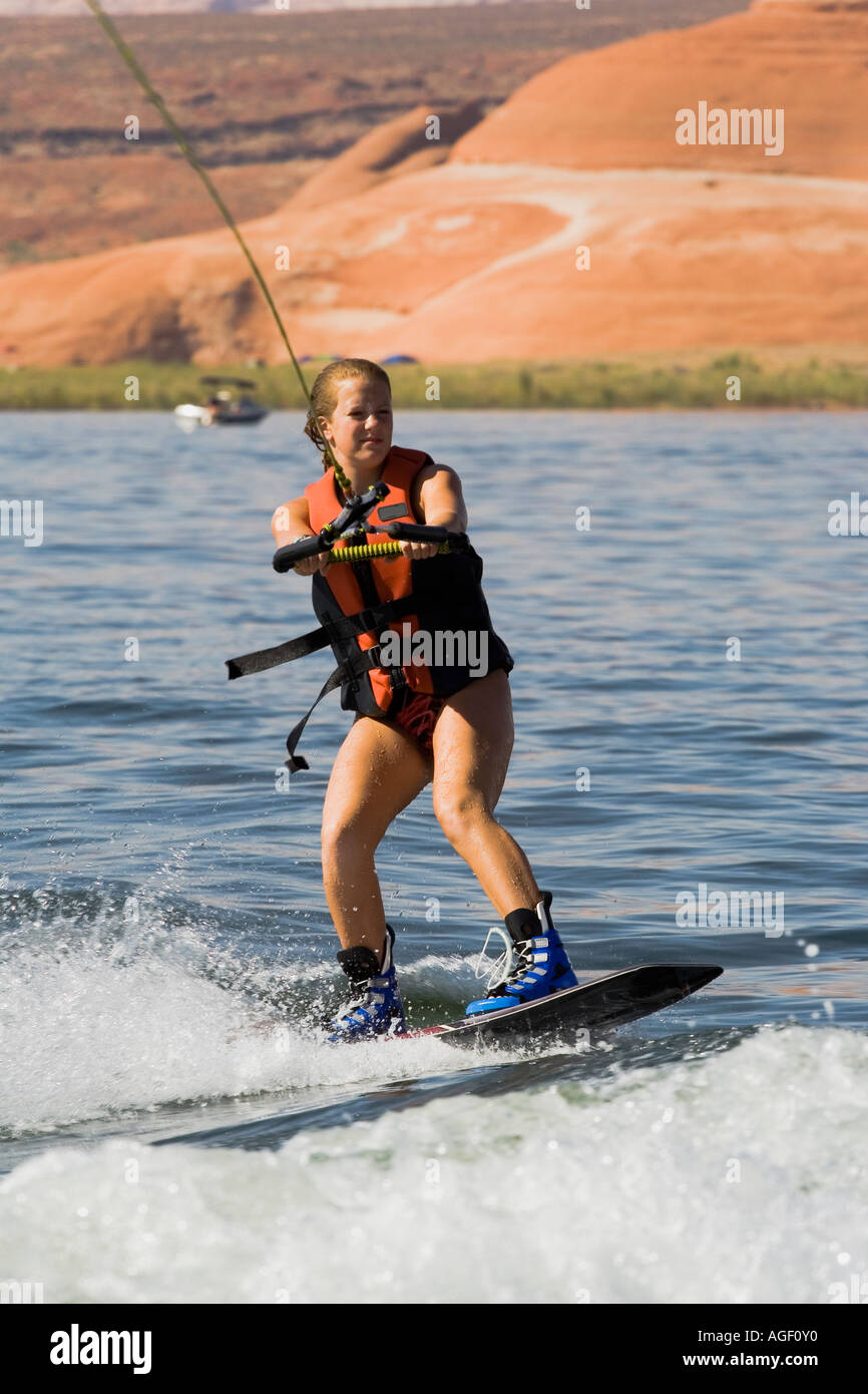 Girl wakeboarding at Lake Powell in Glen Canyon National Recreation ...