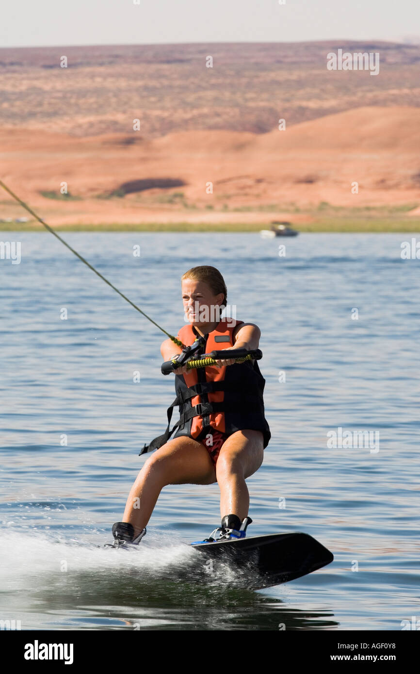 Girl wakeboarding at Lake Powell in Glen Canyon National Recreation ...