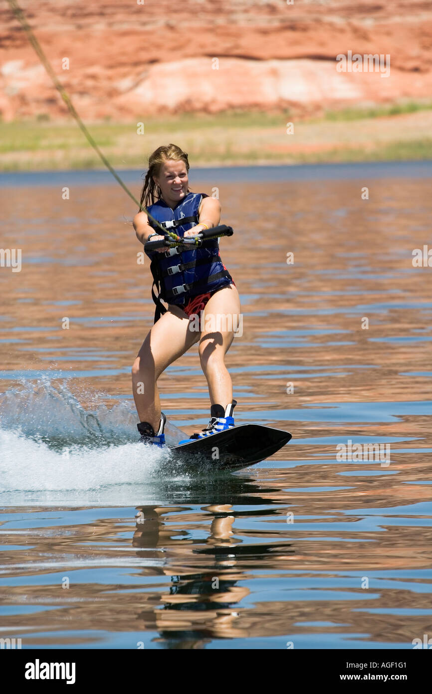 Girl wakeboarding at Lake Powell in Glen Canyon National Recreation ...