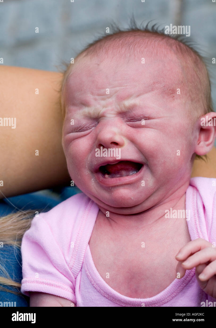 A FEW WEEKS OLD FEMALE BABY CRYING WITH HUNGER Stock Photo - Alamy