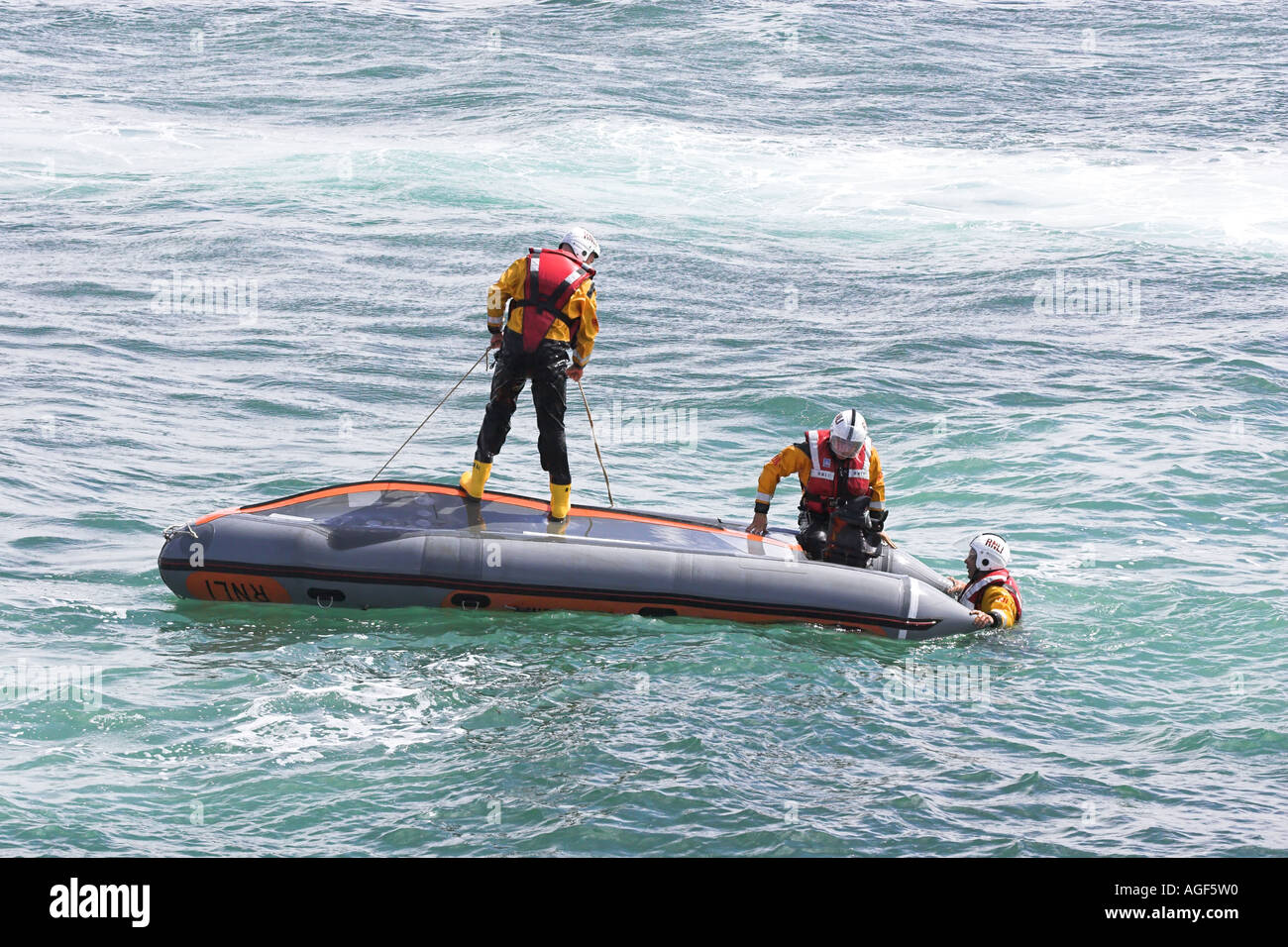 RNLI D series inshore lifeboat in action Capsize drills Stock Photo - Alamy