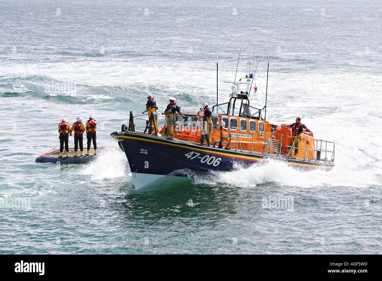 Cromer inshore and offshore lifeboat exercising, capsize drills Stock ...