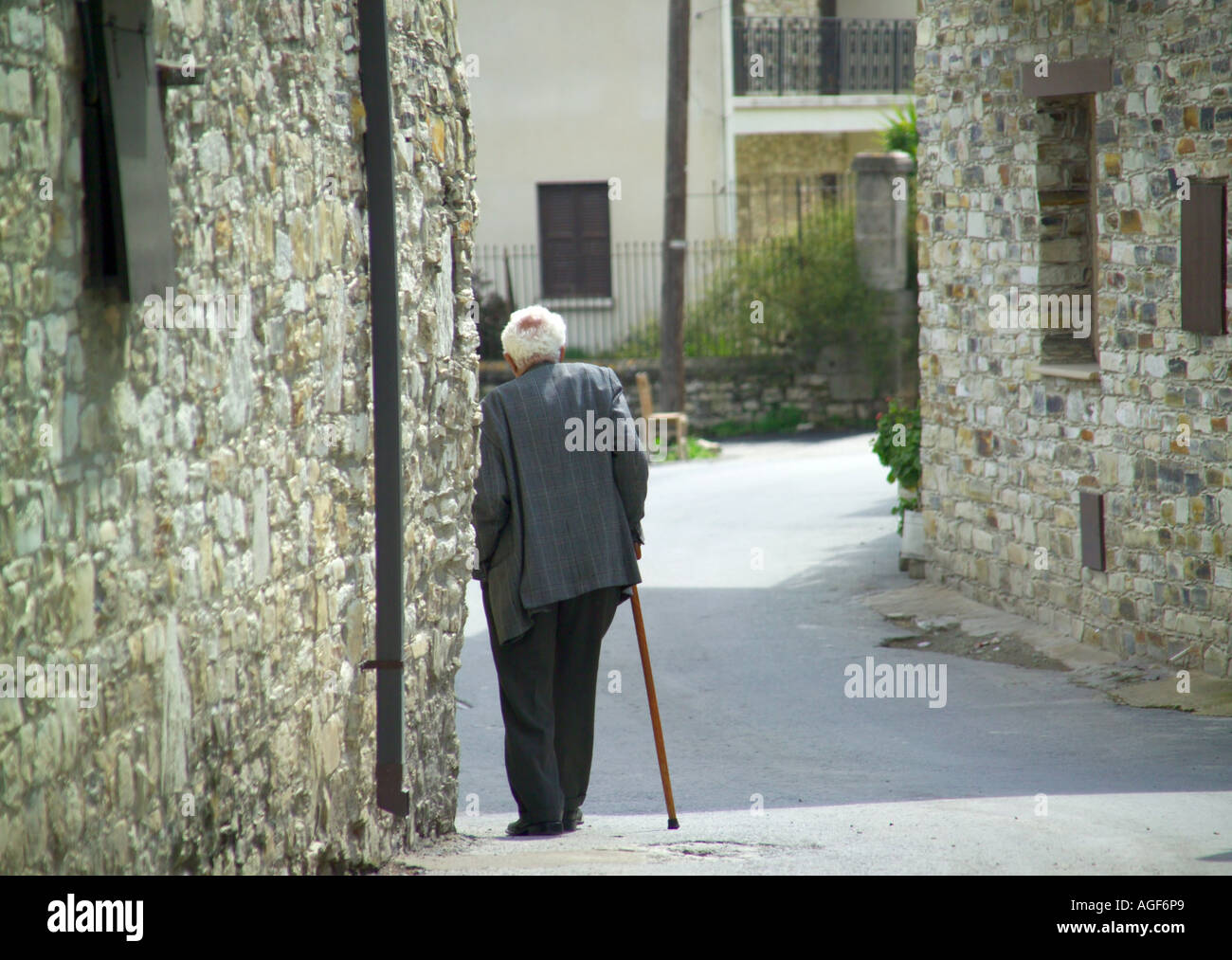 old man walking home in Cyprus village Stock Photo - Alamy