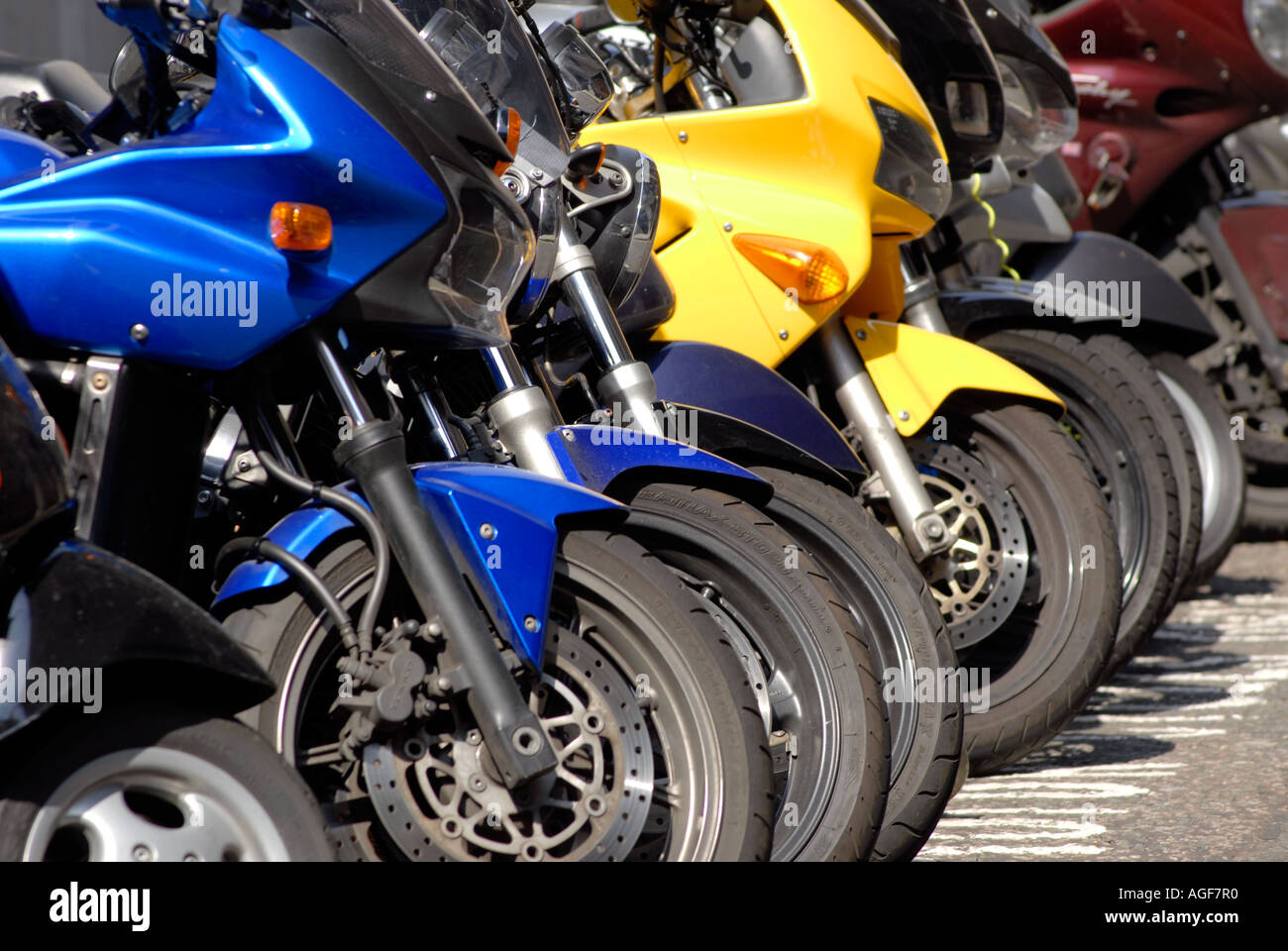 Motorcycles parked in a London street Stock Photo - Alamy