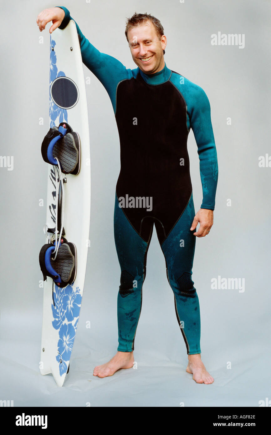 Surfer surfboard diving suit hi-res stock photography and images - Alamy