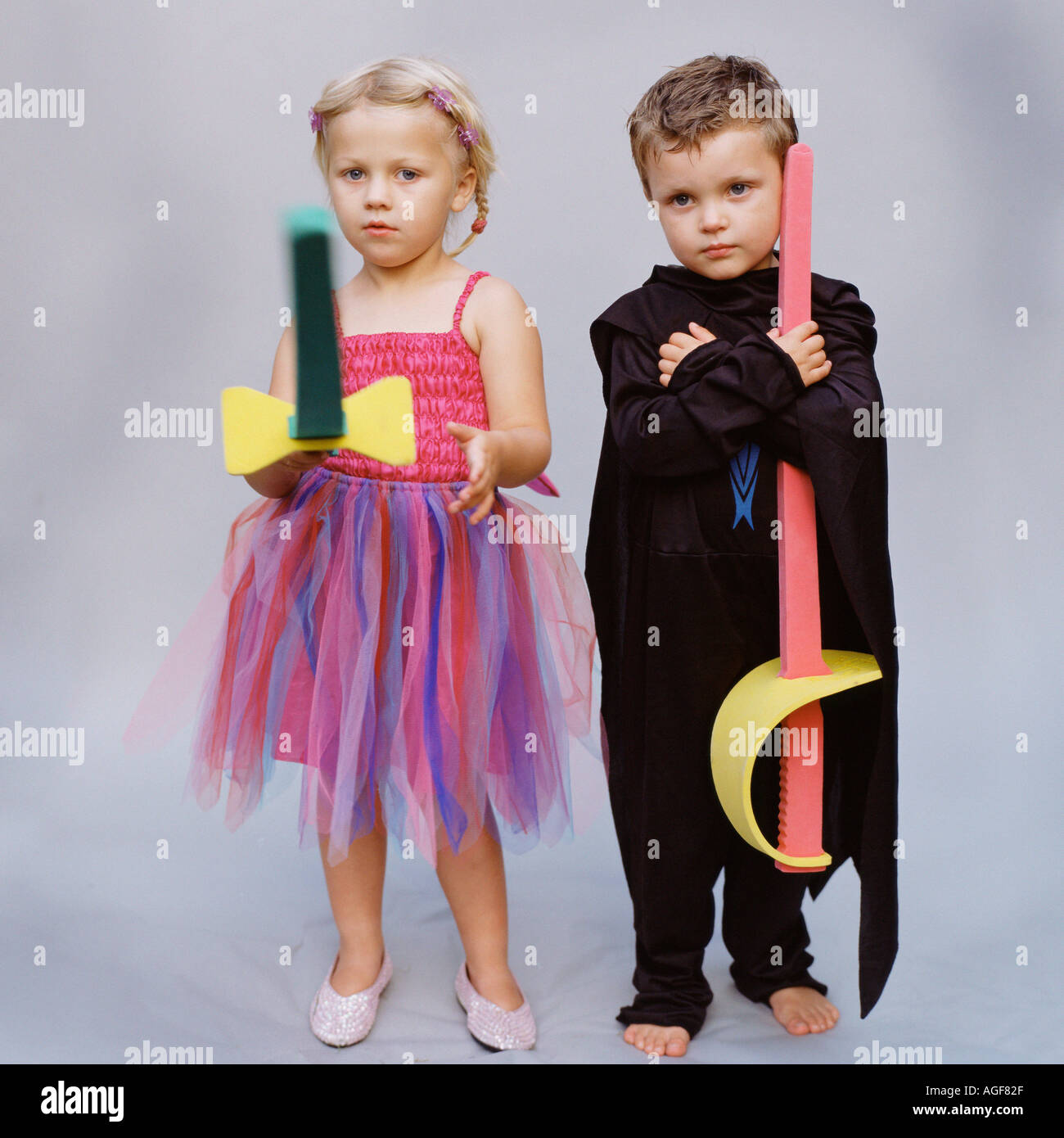 Two children wearing costumes Stock Photo - Alamy