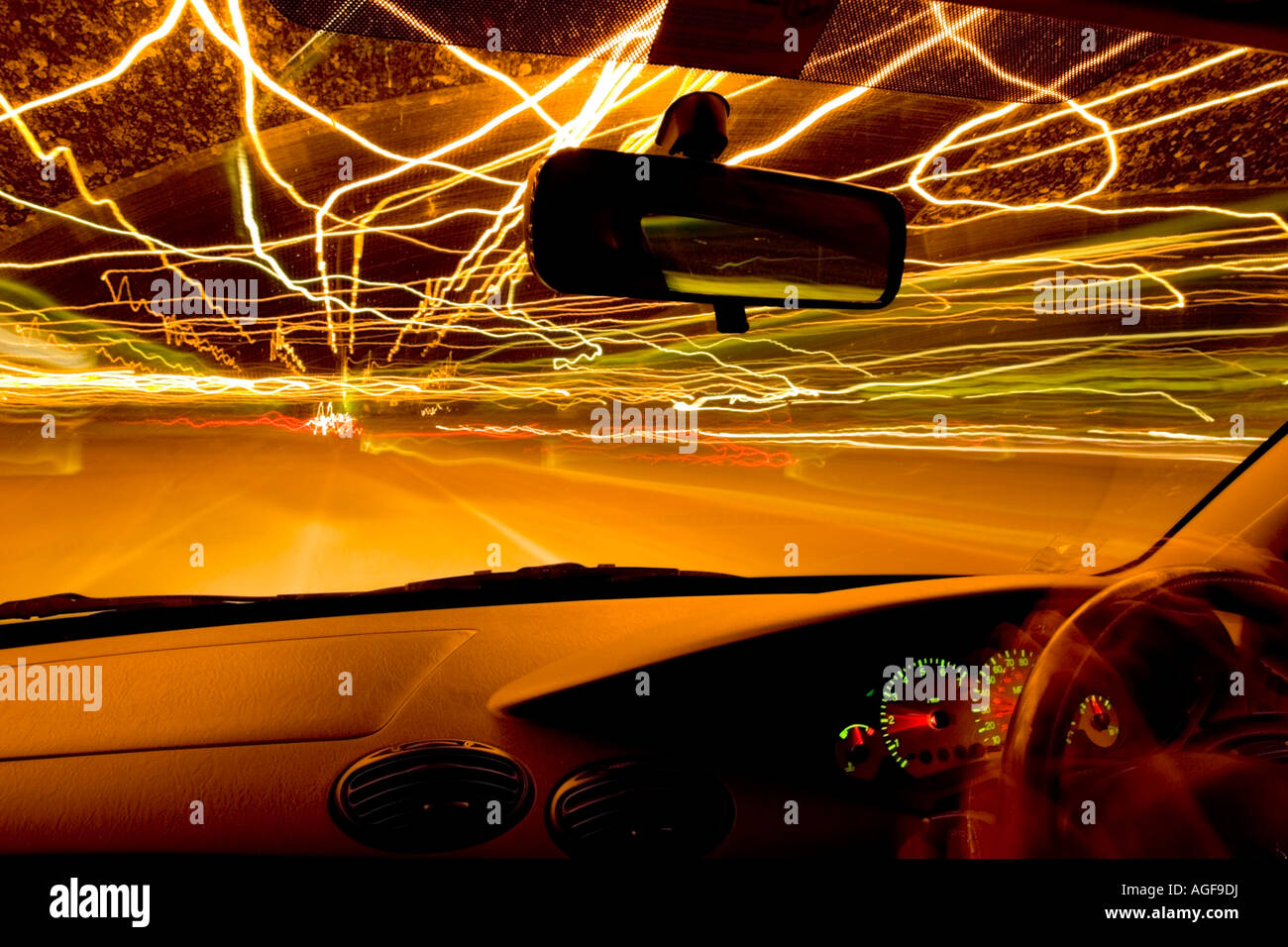 Light trails on a motorway from inside a car Stock Photo - Alamy