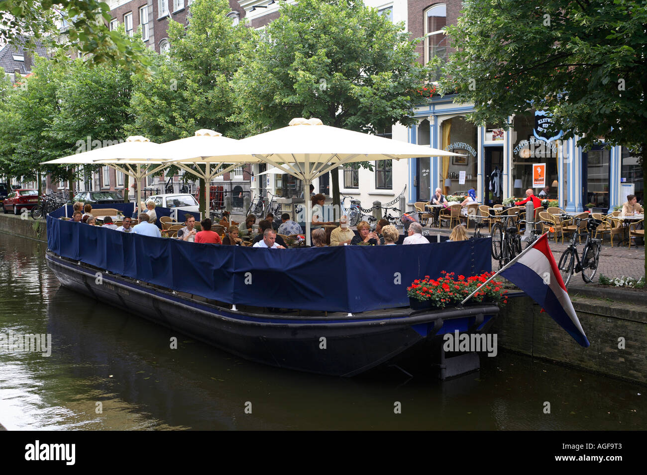 Holland. Delft. Restaurant on barge in canal Stock Photo - Alamy