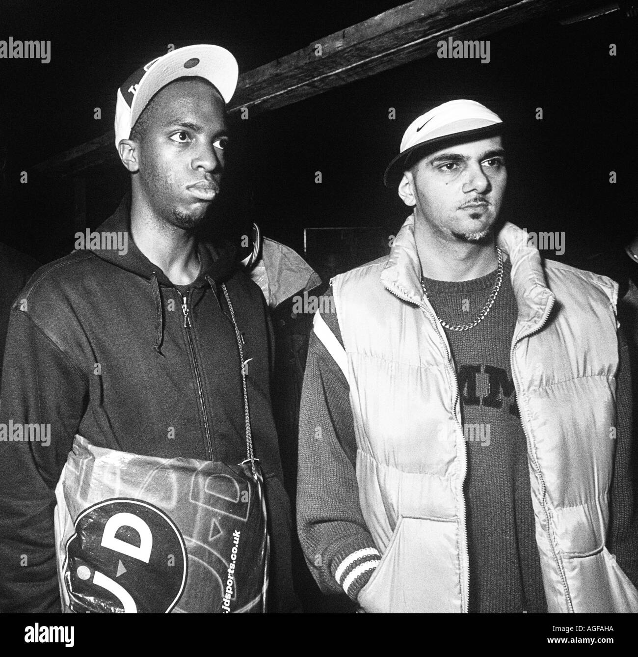 Two black guys Black and White Stock Photos & Images - Alamy