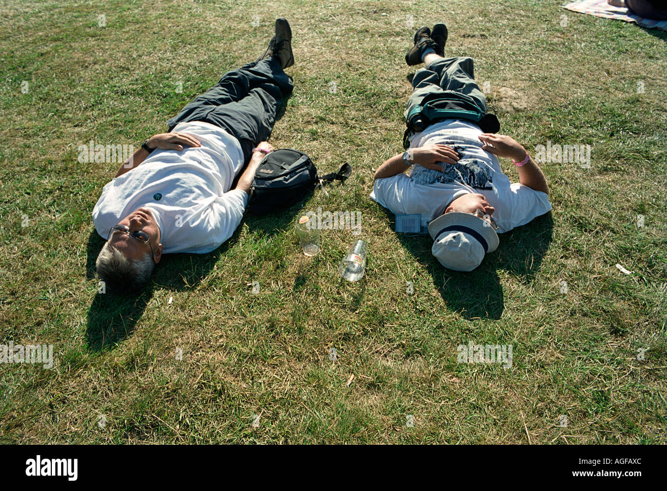 Two men relaxing at the Big Chill festival Stock Photo - Alamy