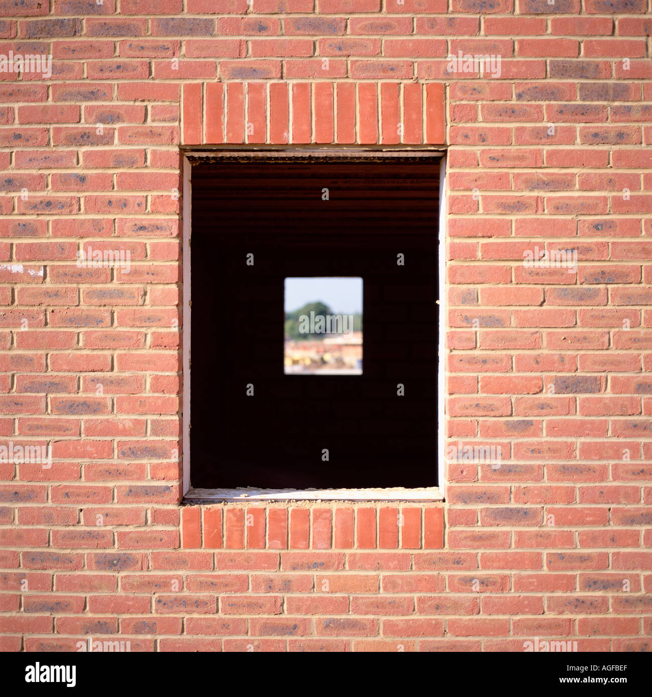 Brick wall with window Stock Photo - Alamy