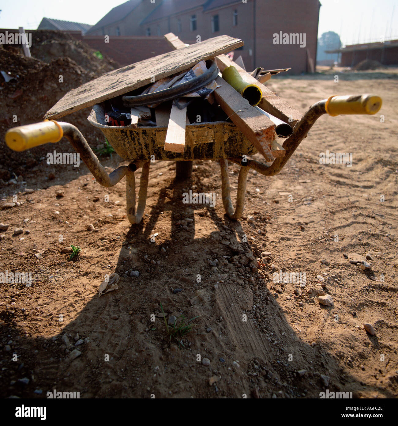 Wheelbarrow with building waste Stock Photo - Alamy