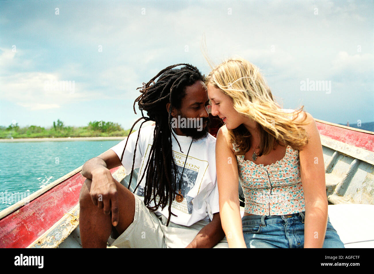 Habte and Sarah on a boat to Lime Cay off Kingston Jamaica Stock Photo ...