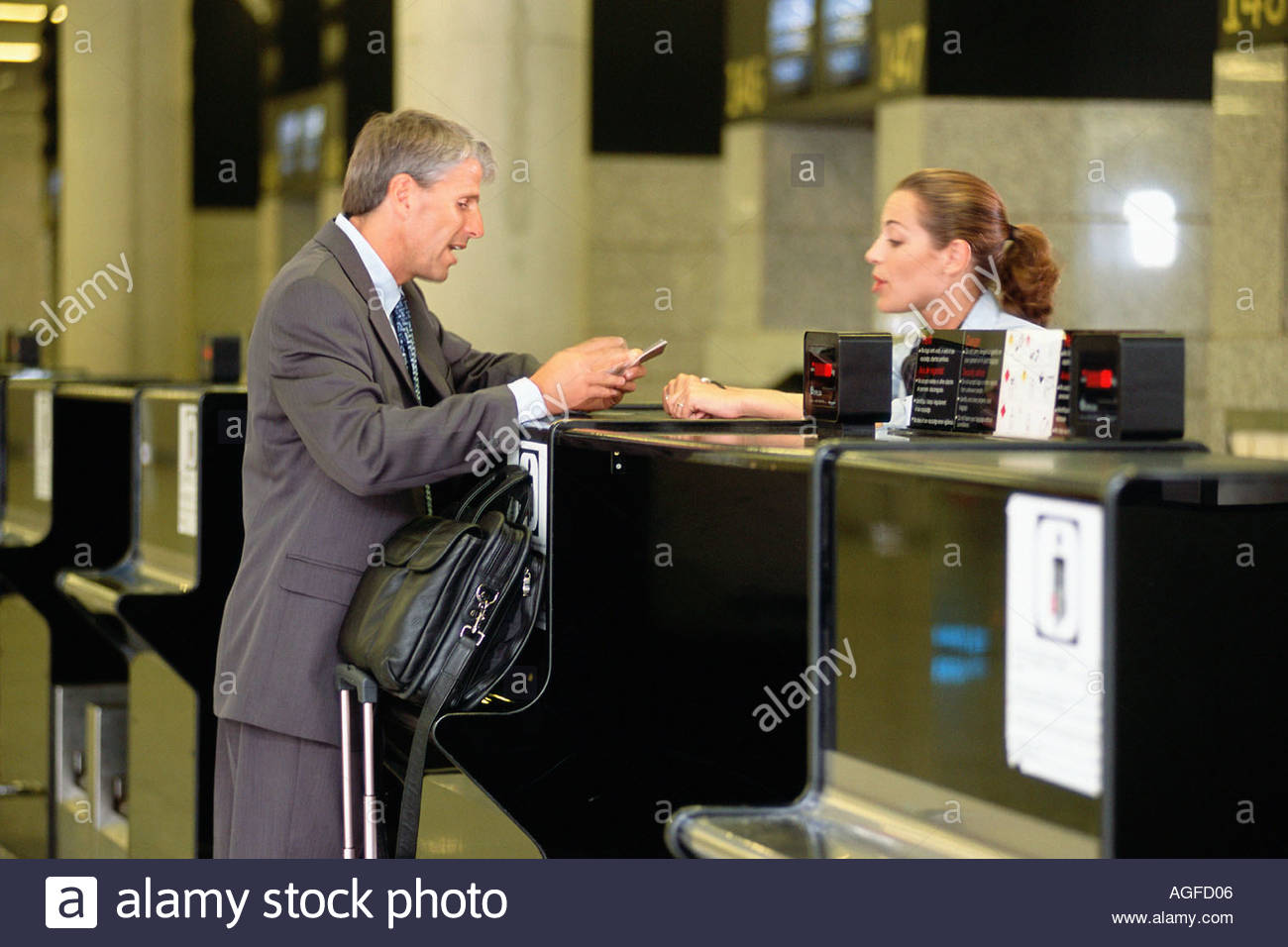 Airport Check In Desk Stock Photos & Airport Check In Desk Stock Images ...