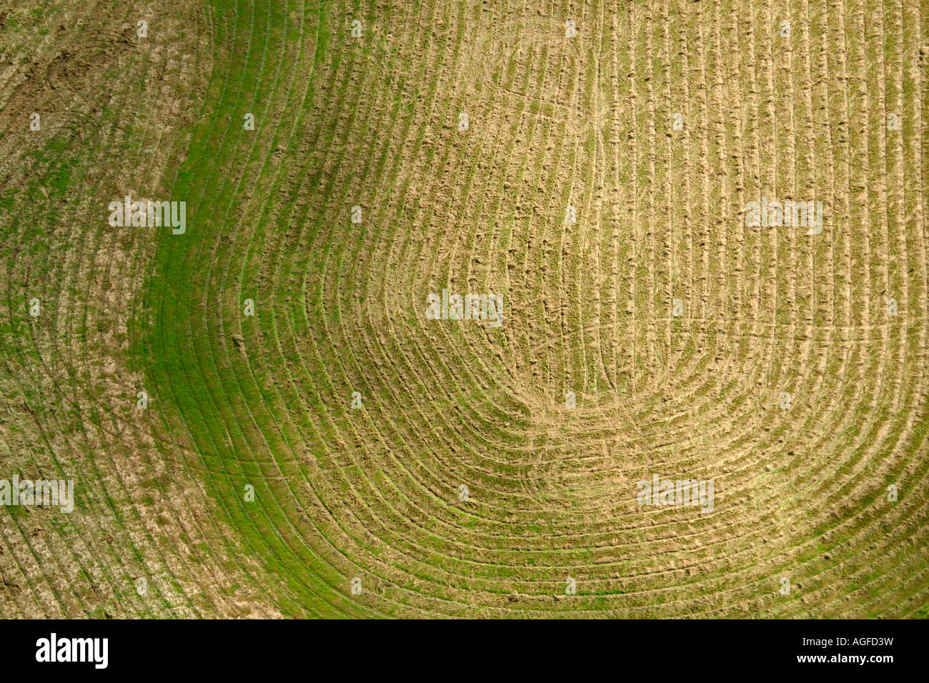Aerial shot of patterns in a field left by farm machinery Stock Photo ...