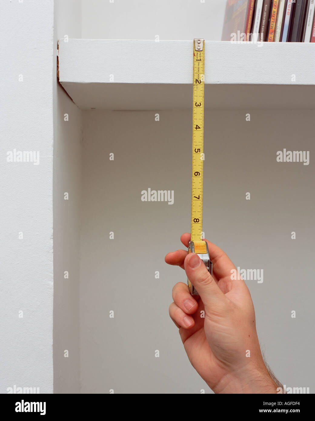 Measuring shelf height Stock Photo - Alamy