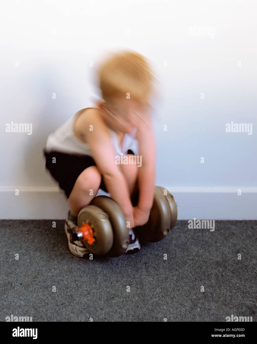 Lifting heavy weight child hi-res stock photography and images - Alamy