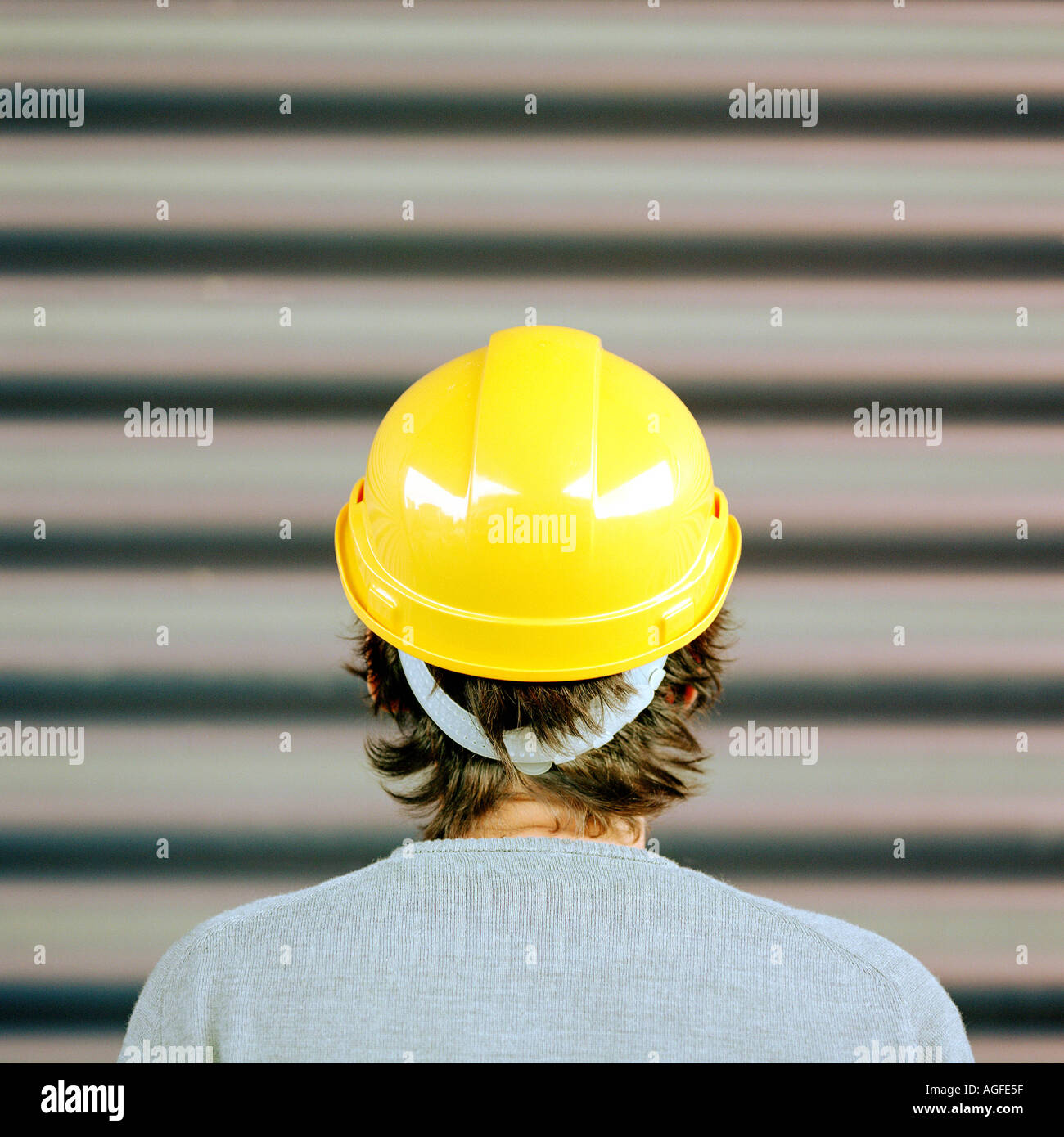 Man wearing a hard hat Stock Photo - Alamy