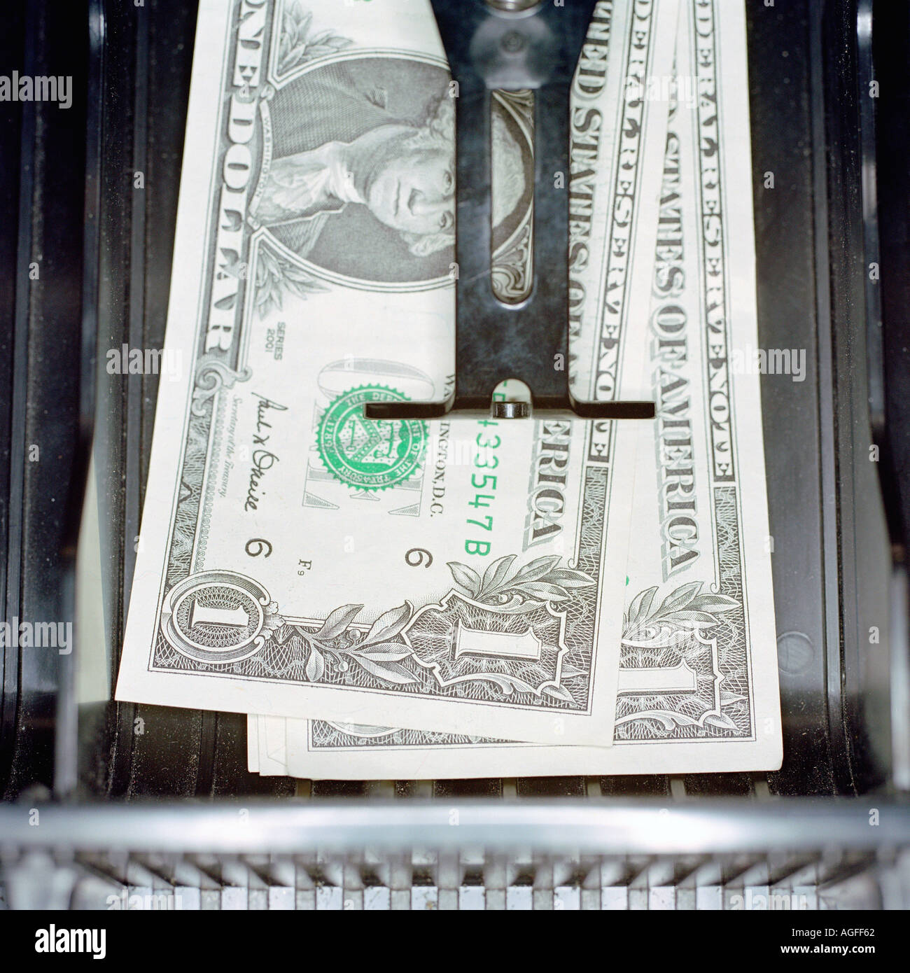 Dollar bills in cash register Stock Photo - Alamy