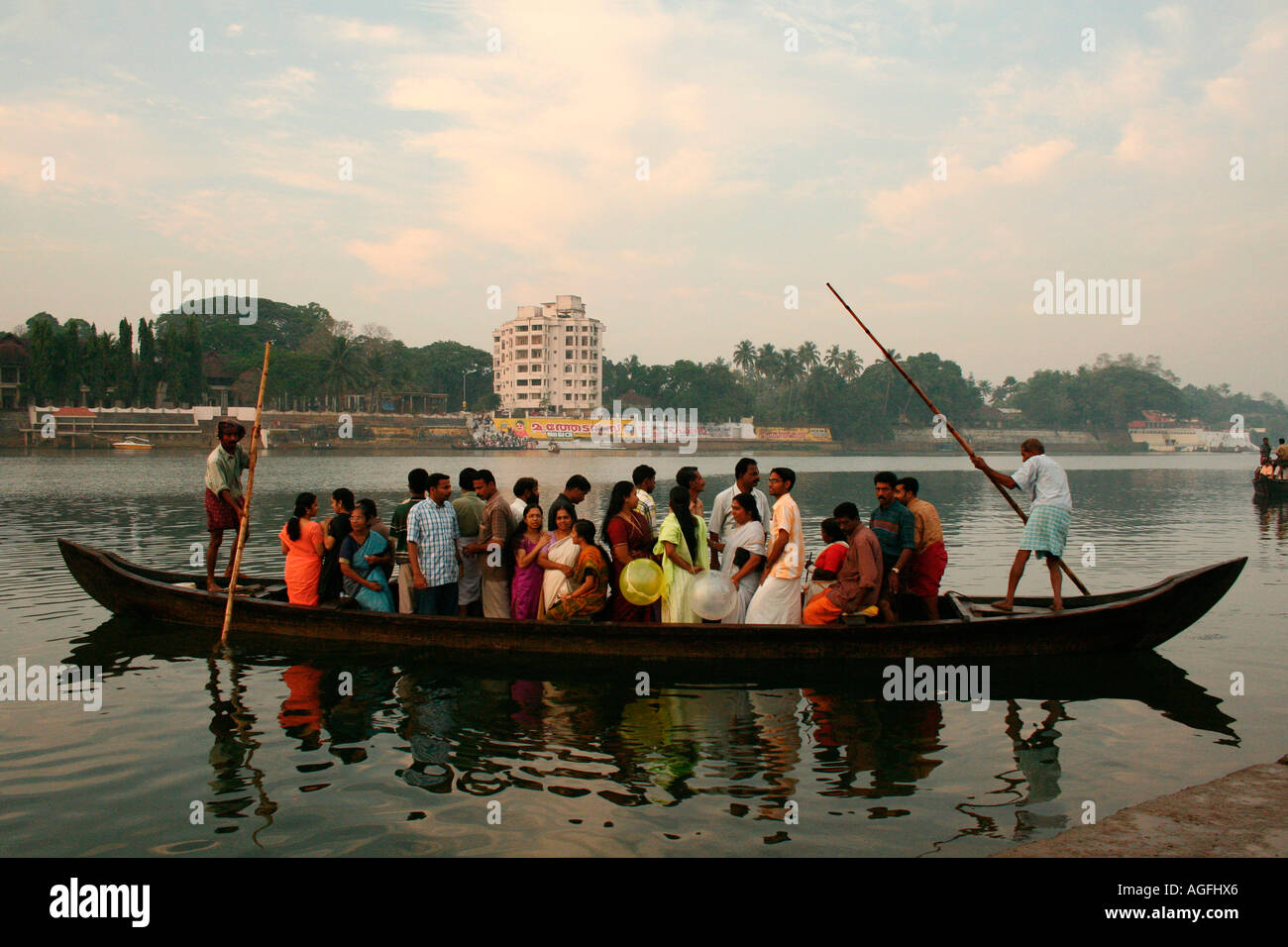 People travelling in a small boat in Kerala, South India Stock Photo ...