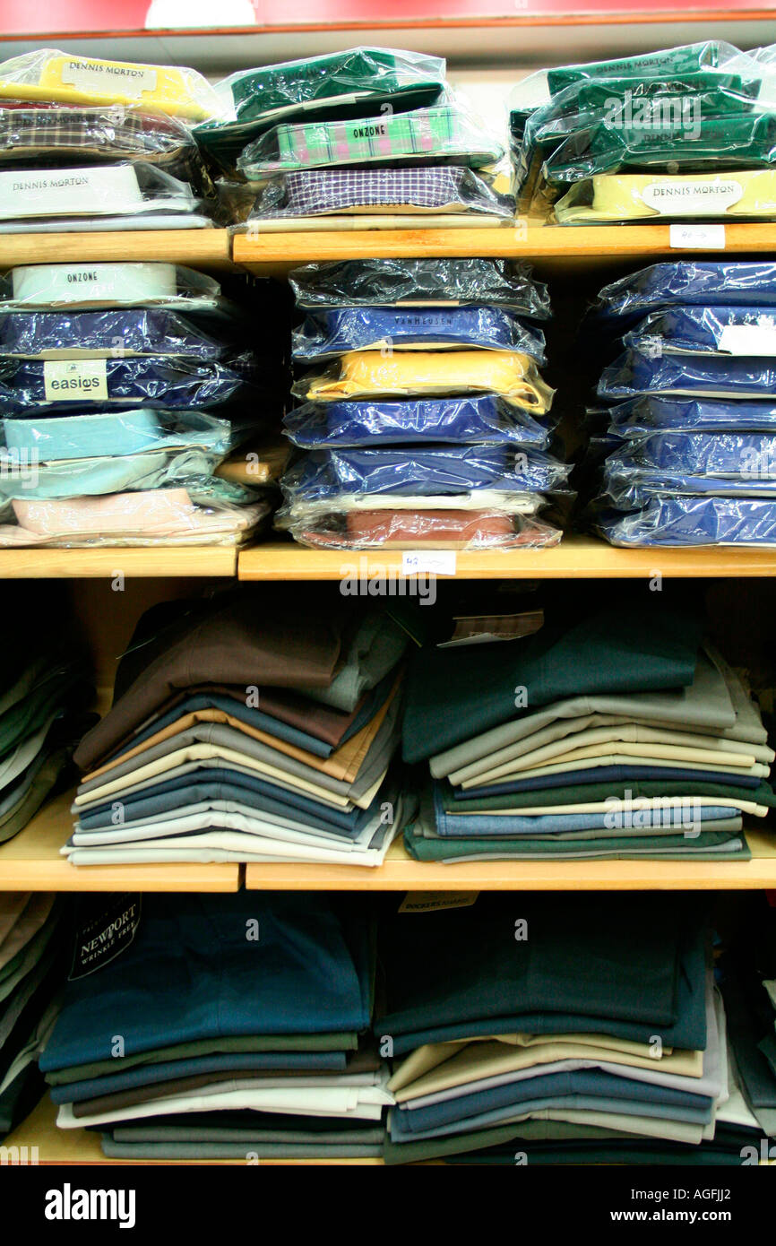 Menswear arranged by segments in a textile shop in India Stock Photo ...