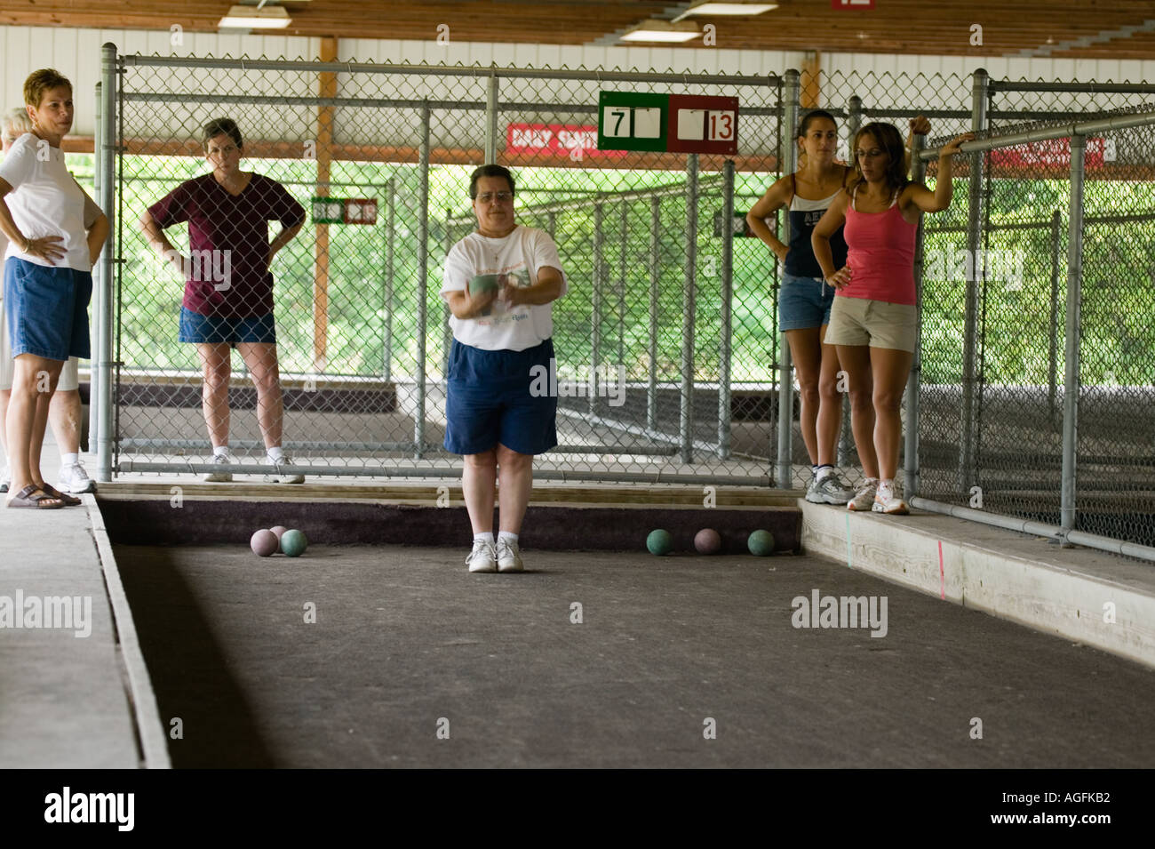 Woman pointing at bocce tournament Rome New York Stock Photo - Alamy