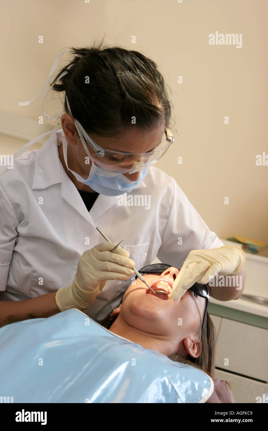Dental Surgery Dentist nurse and patient being examined Stock Photo - Alamy