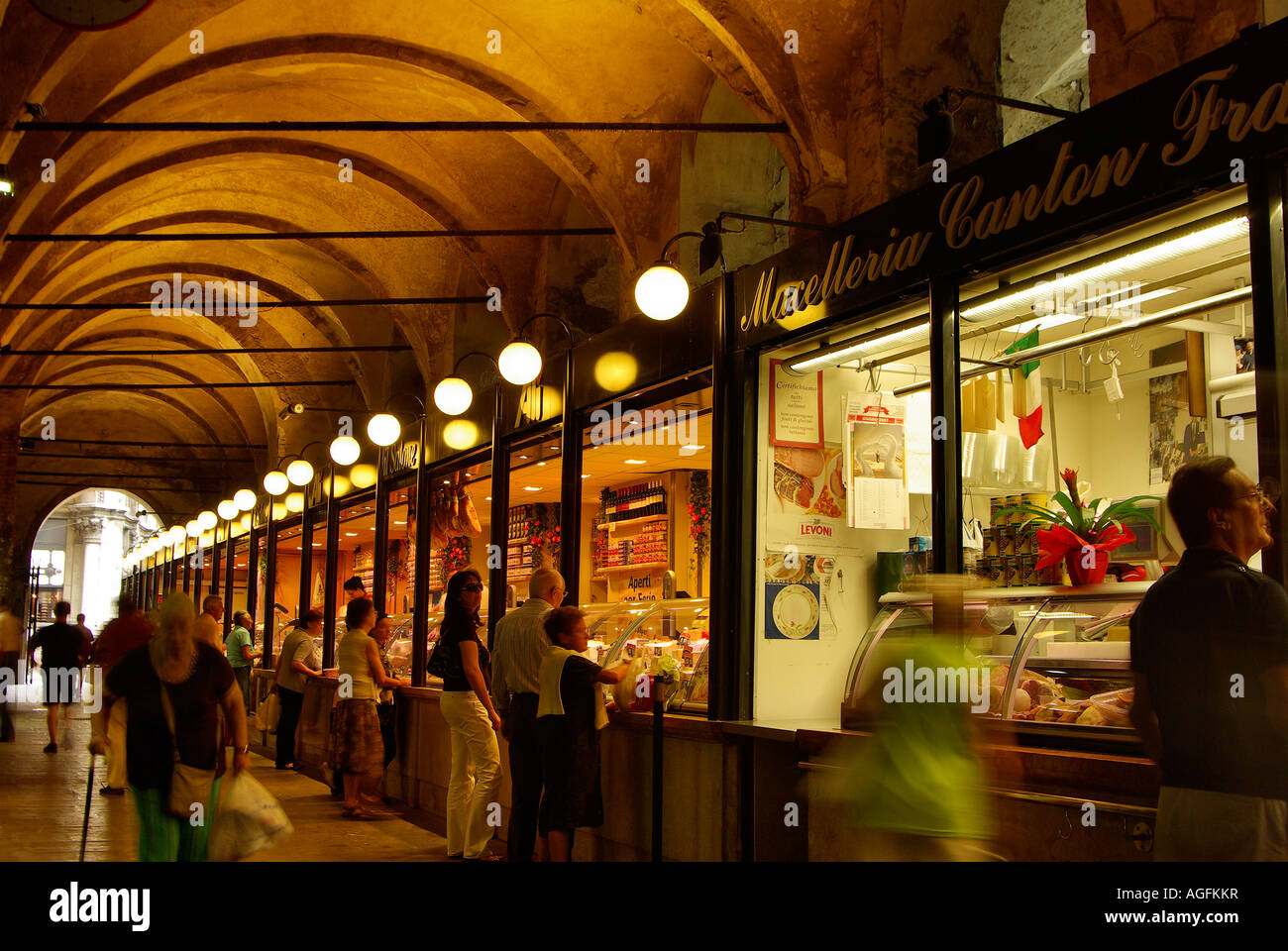 People shopping in the food market of Palazzo della Ragione Padua ...