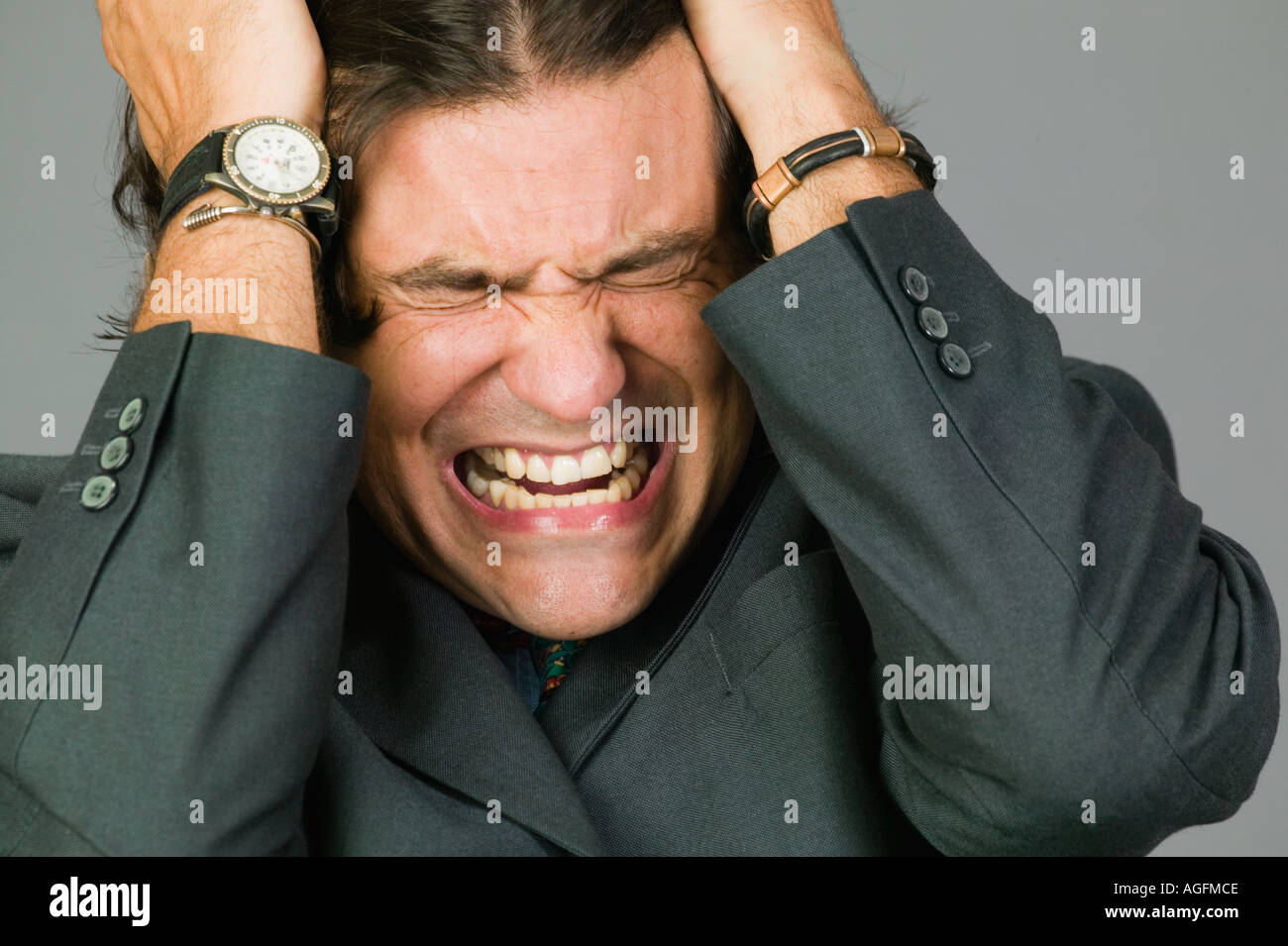 Angry latino man suit hi-res stock photography and images - Alamy