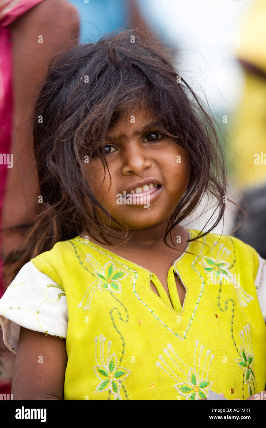 Poor indian girl in yellow dress. Andhra Pradesh, India Stock Photo - Alamy