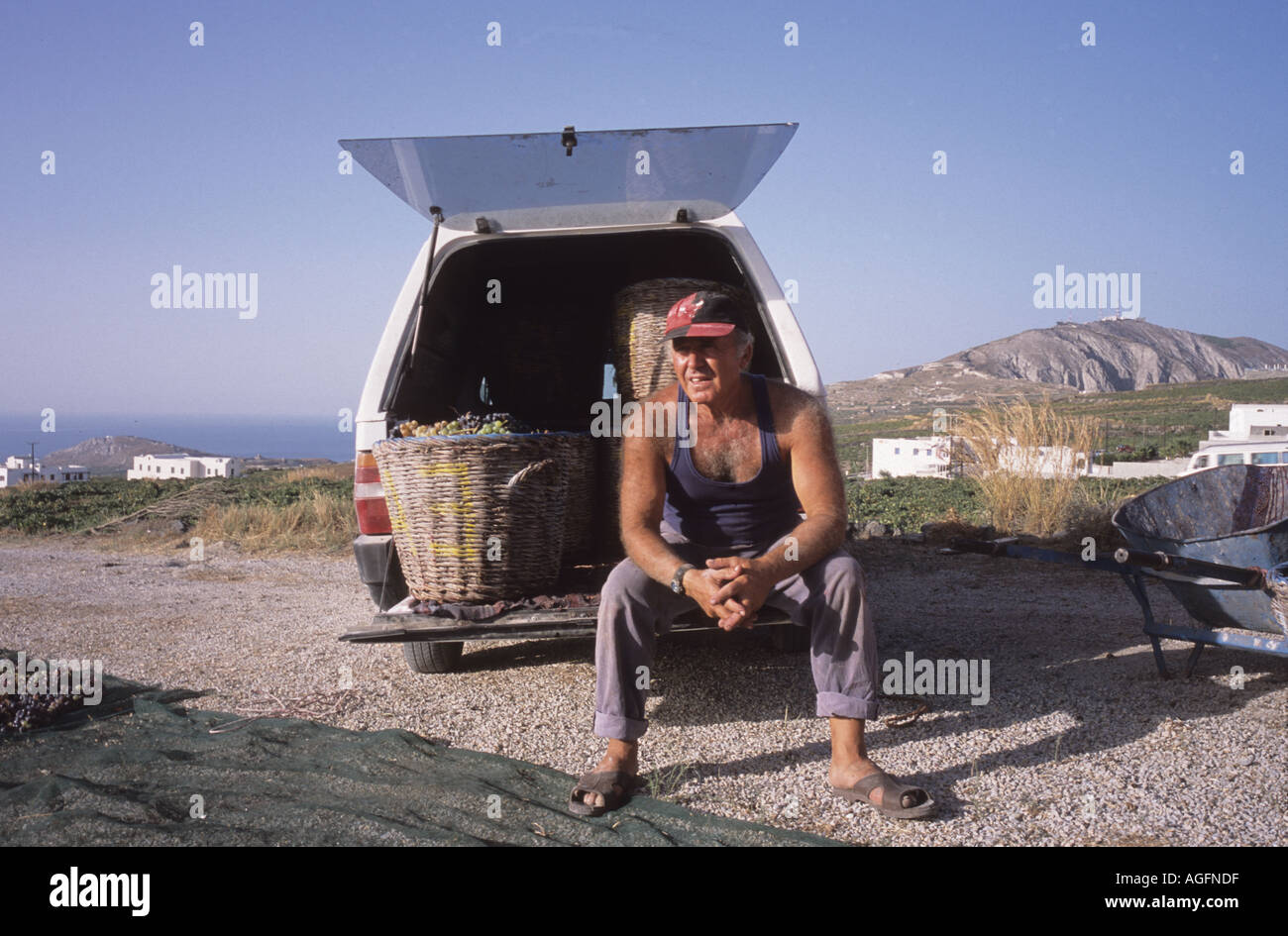 man at work men at work man sitting on truck in santorini Greece ...