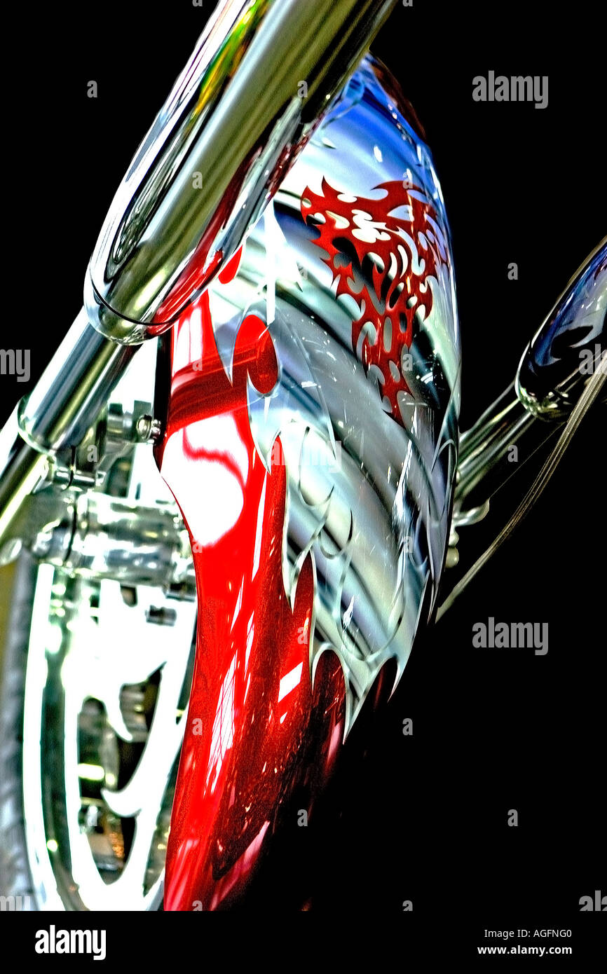 A low angle side view picture of the front forks wheel and custom ...
