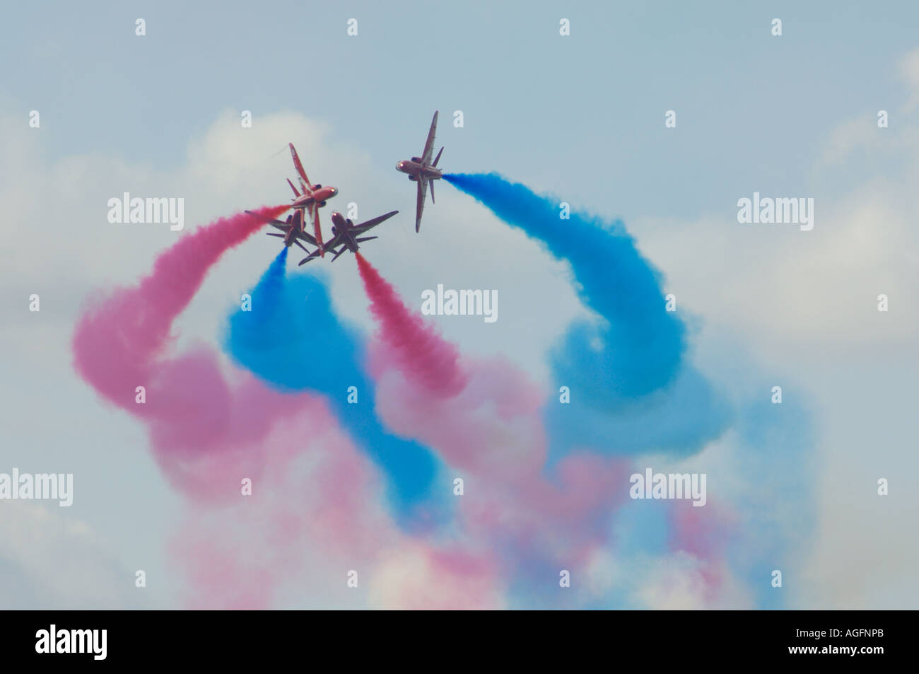 Close formation flying by the British Red Arrows display team Stock ...