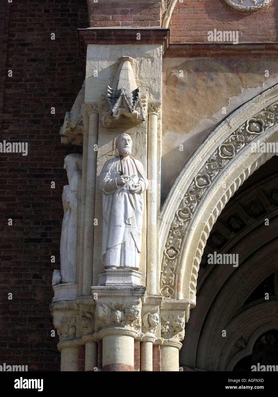 Marble statue 1470 on the portal of Santa Maria Assunta Catholic ...